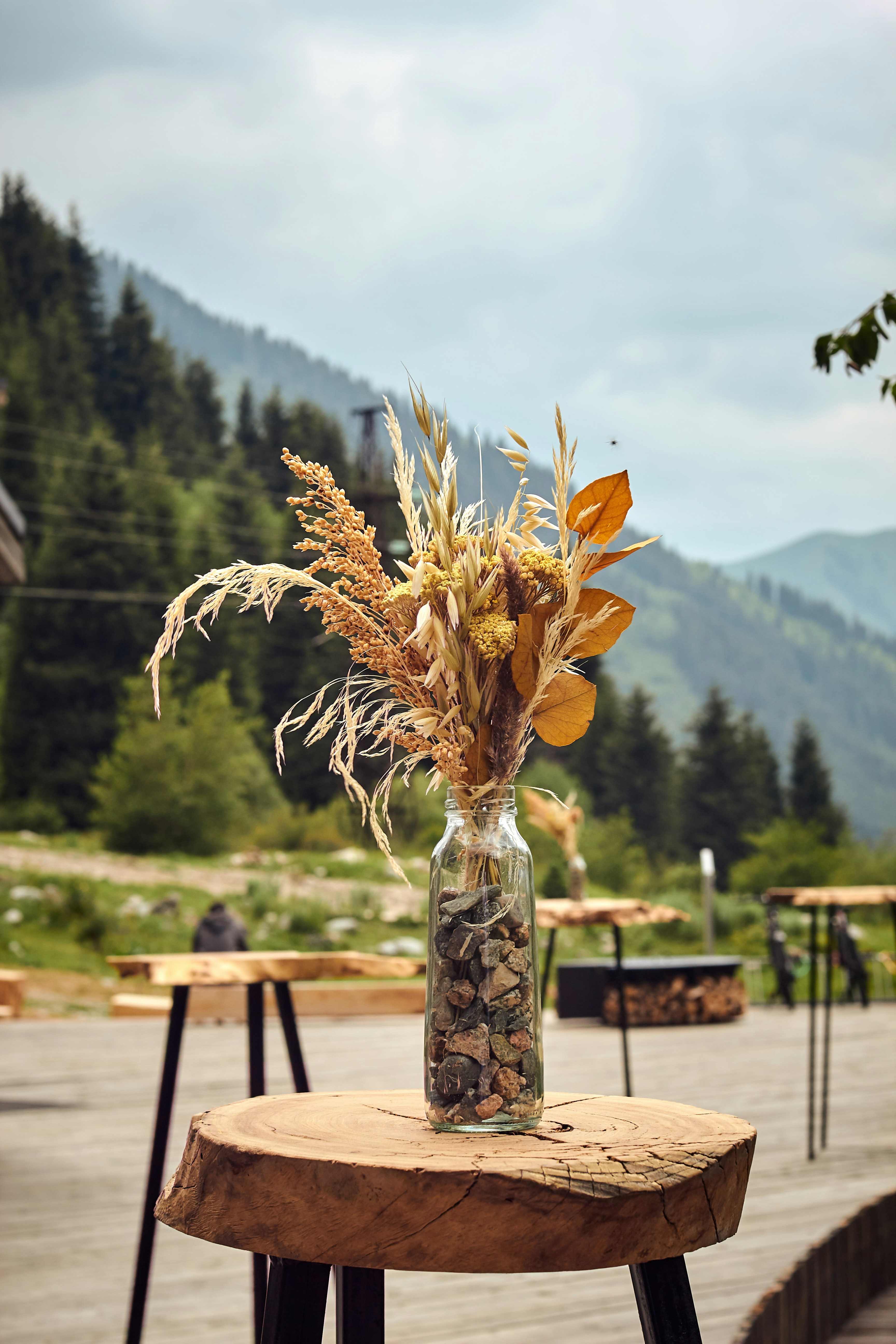 a vase with yellow flowers