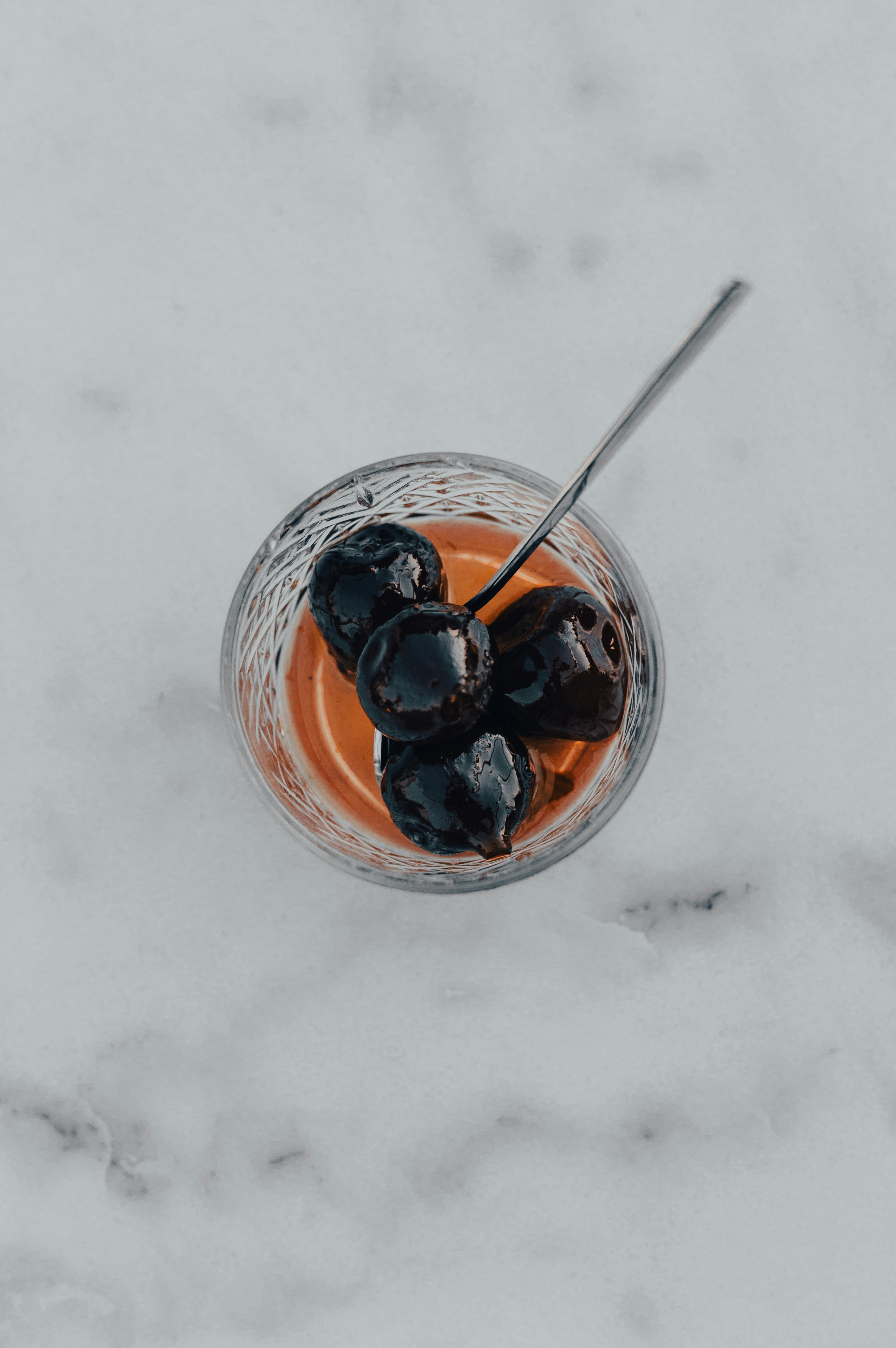 a spoon in a bowl of food