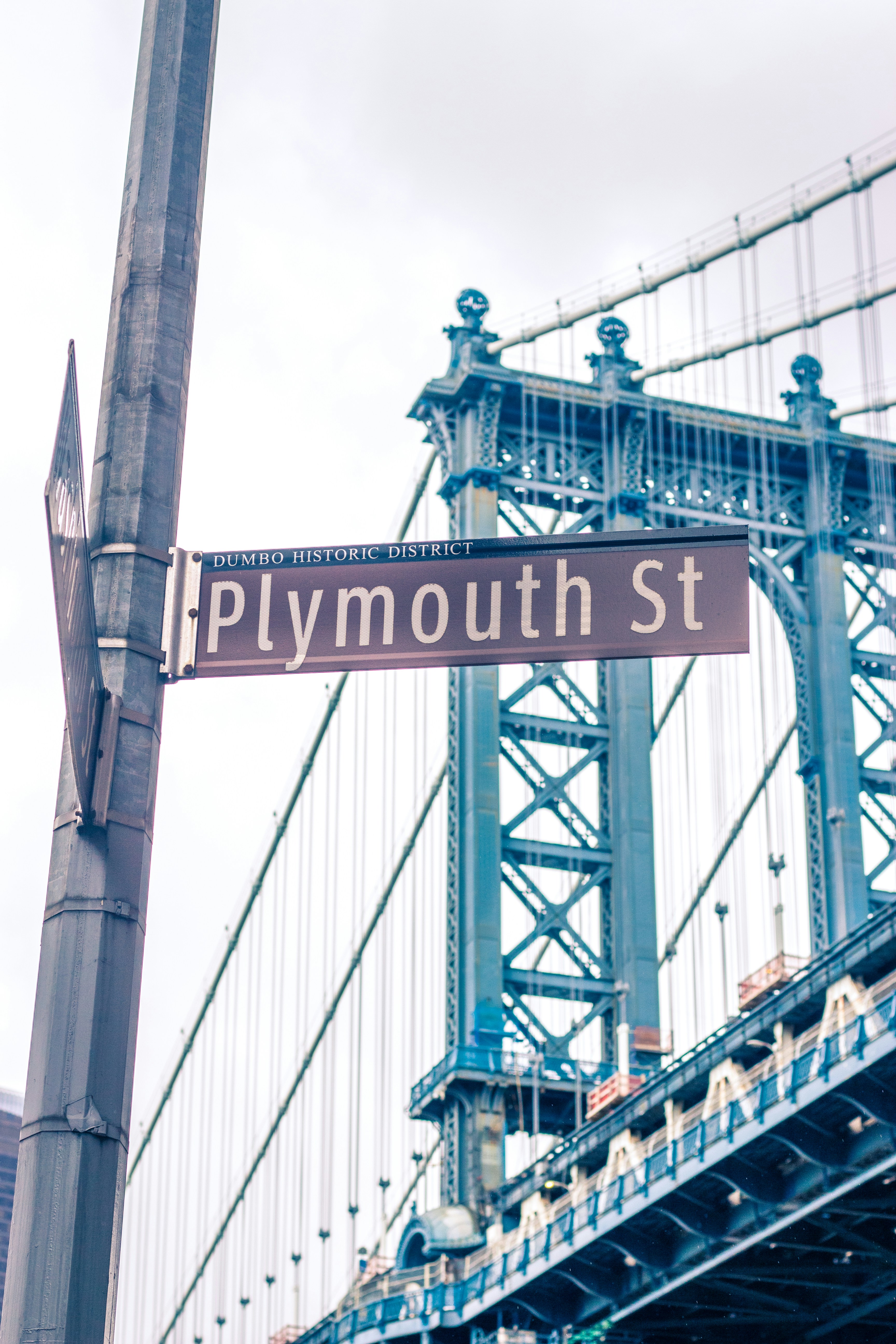 Plymouth Street Sign Framed by the Blue Span