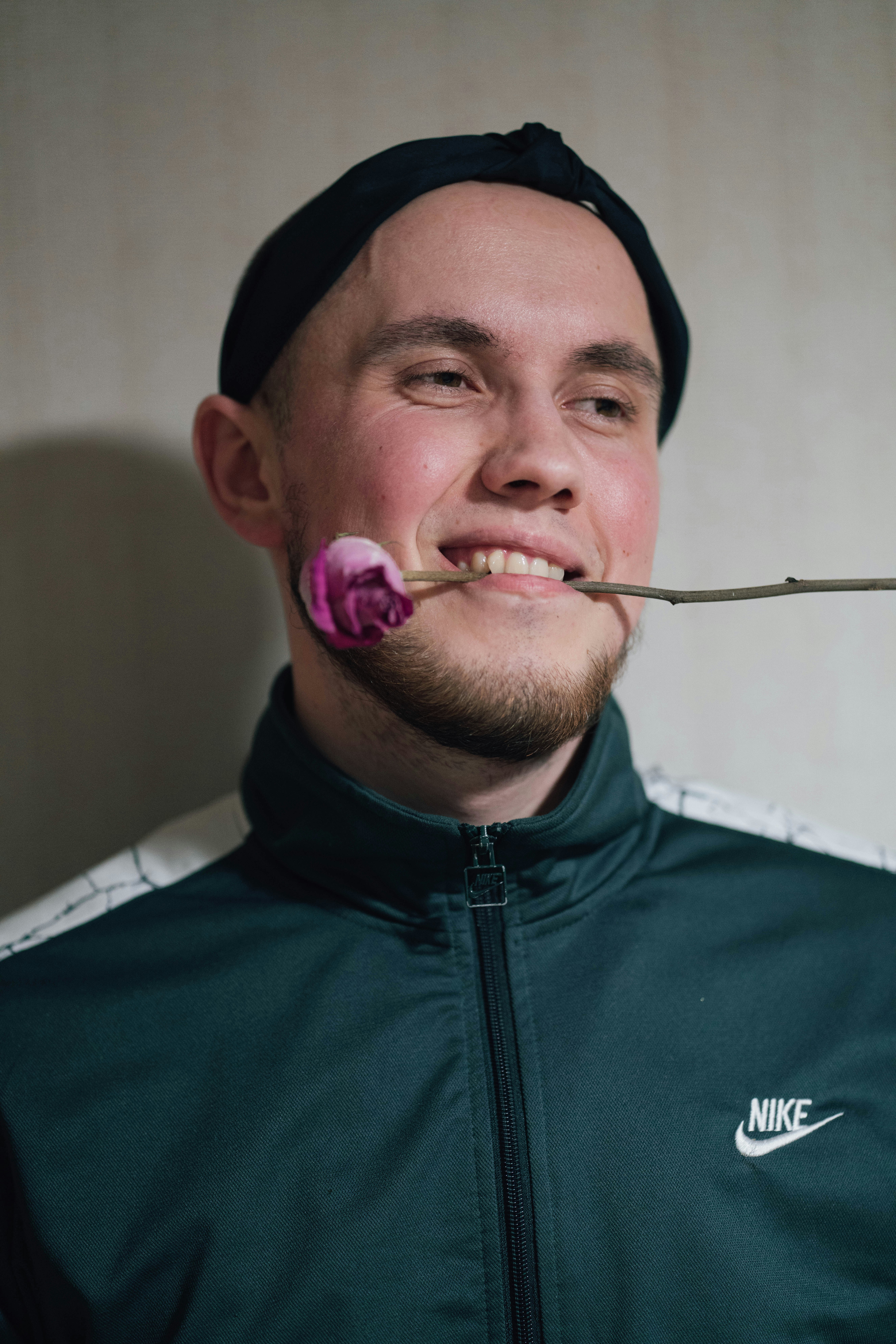 Petal-Bite Portrait: A rose-tinted, cheeky moment