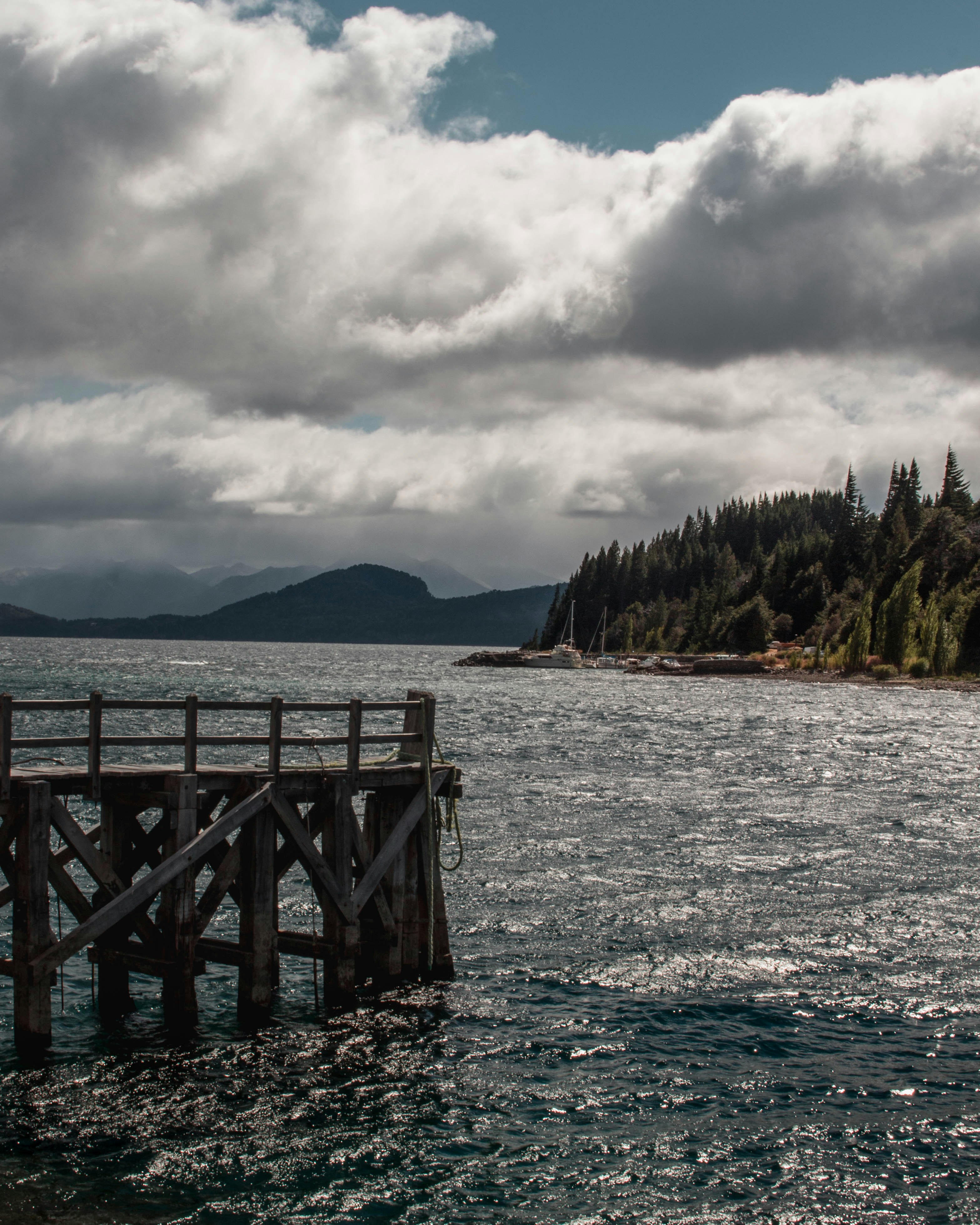 A wooden dock over water photo – Free Grey Image on Unsplash