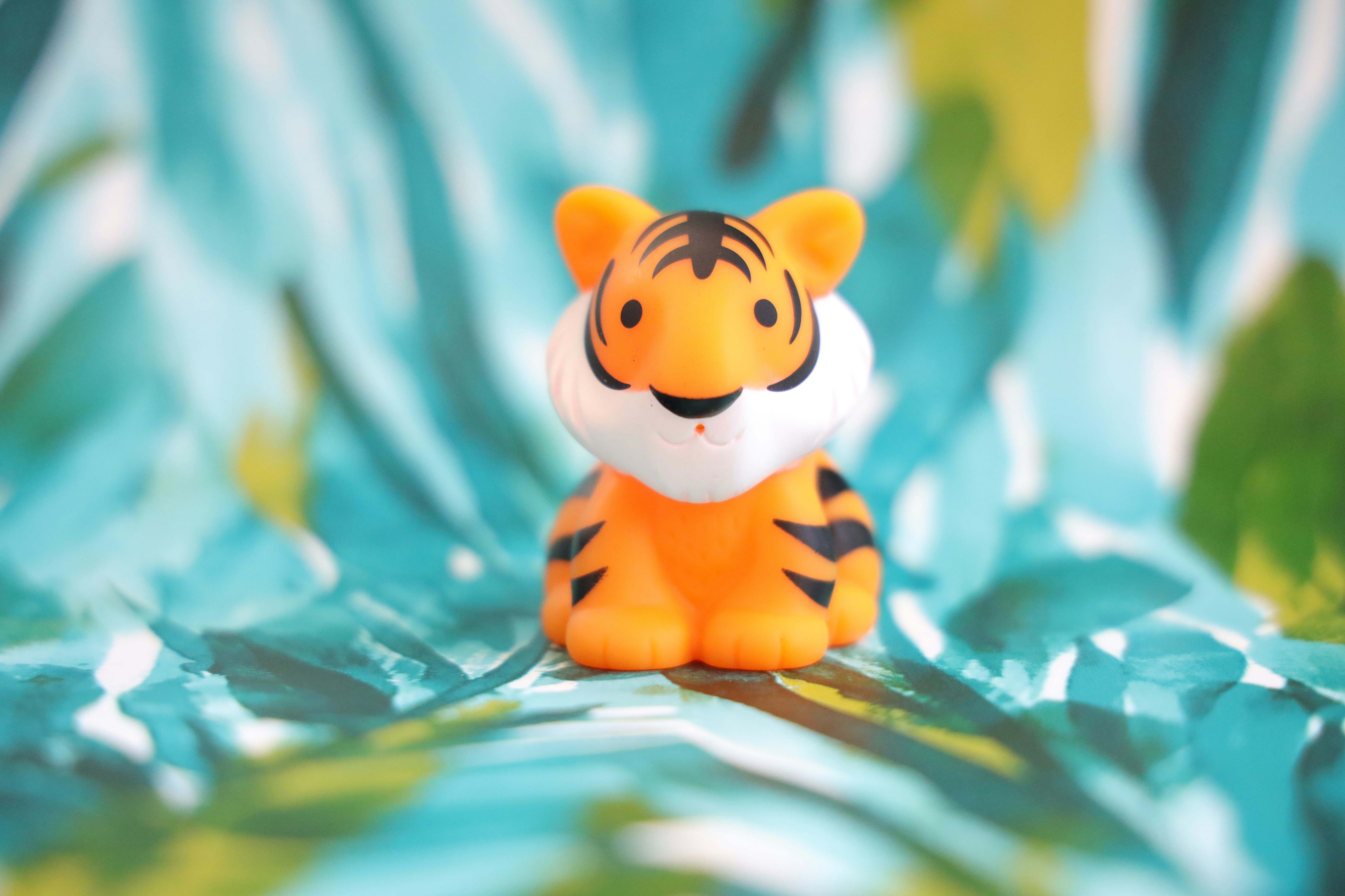 Tiny Tiger, Big Smile: A Plush Idol on a Paper Jungle