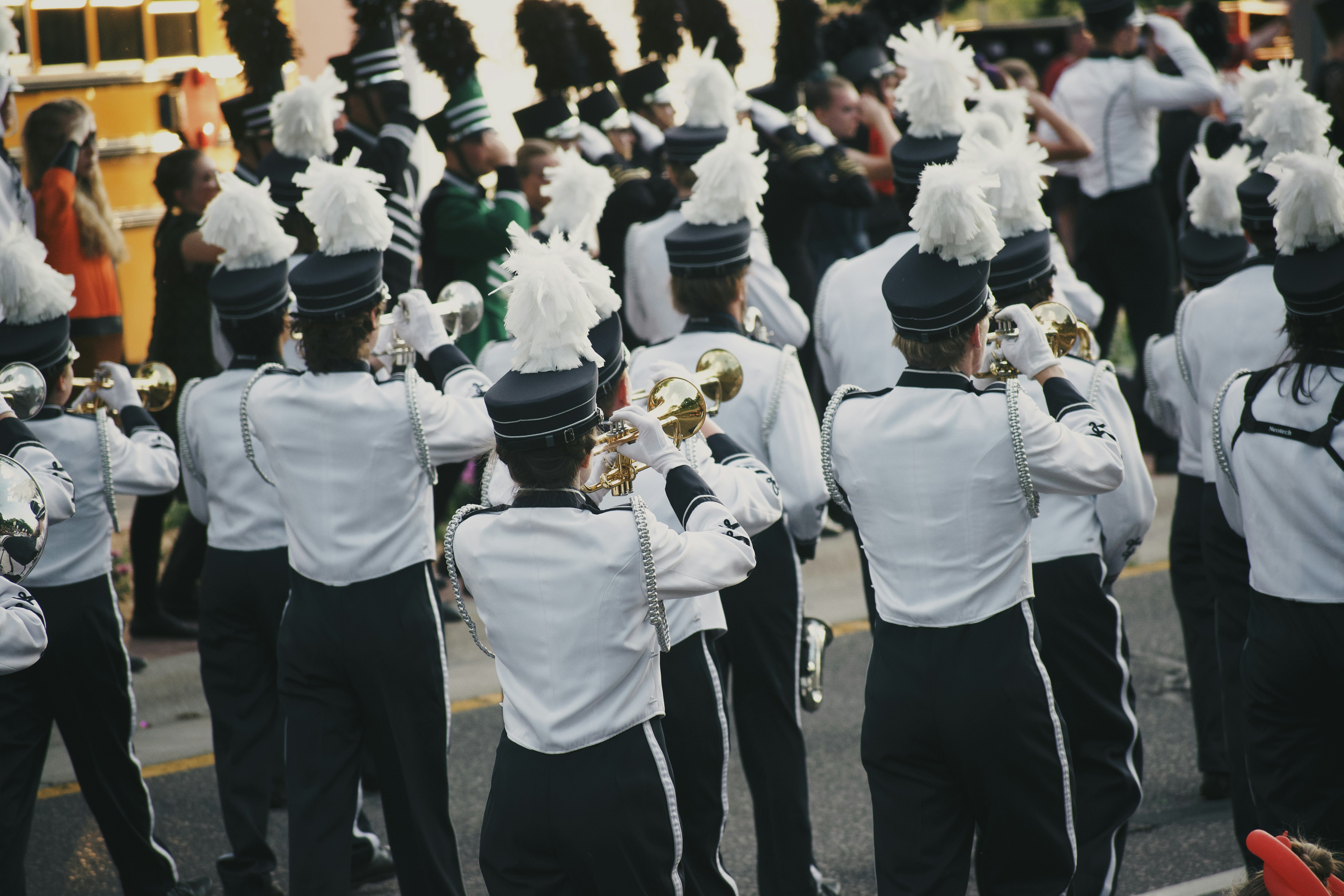 A group of people in uniform marching photo – Free Grey Image on Unsplash