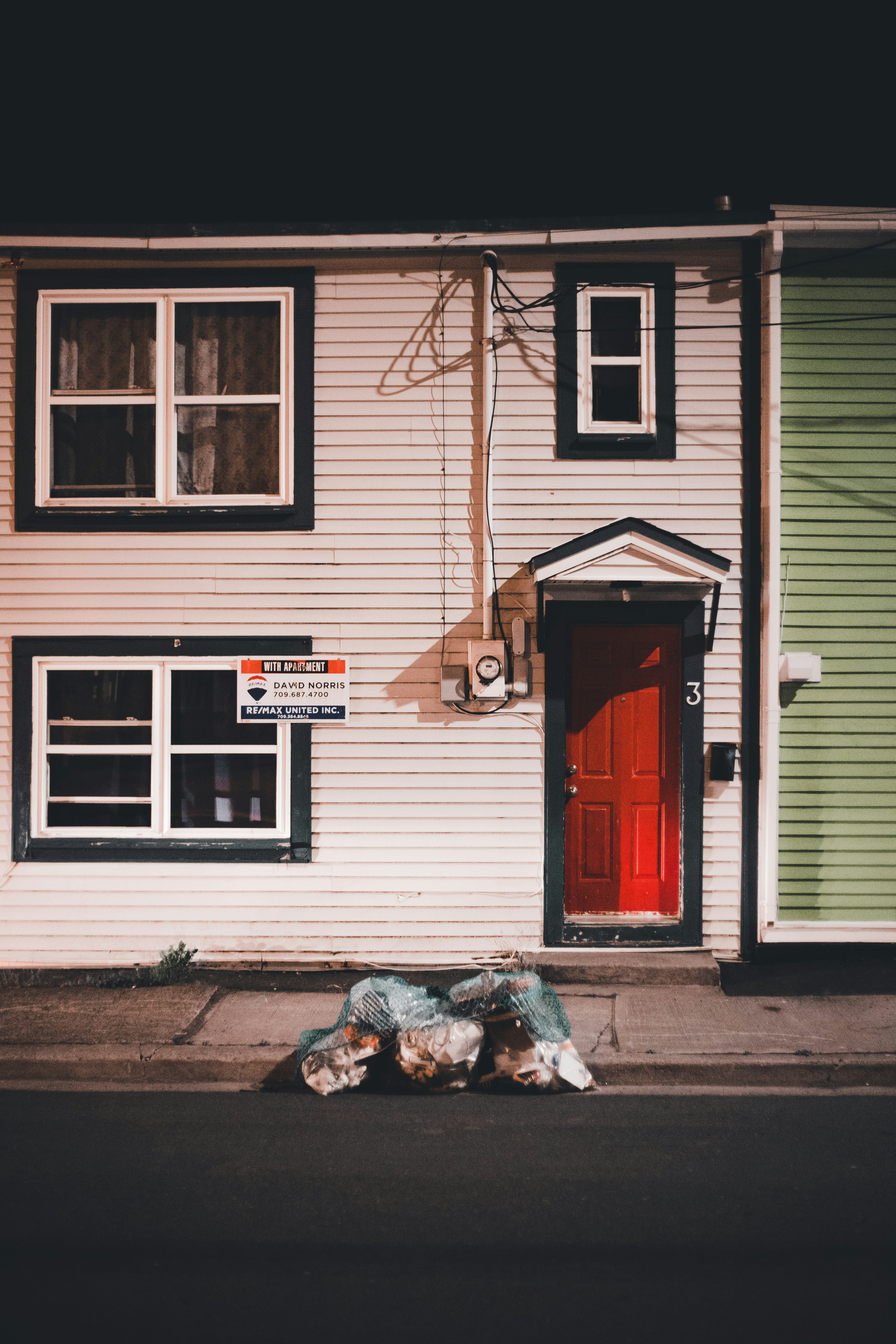 Crimson Door on a Quiet Street: A Minimal Urban Portrait
