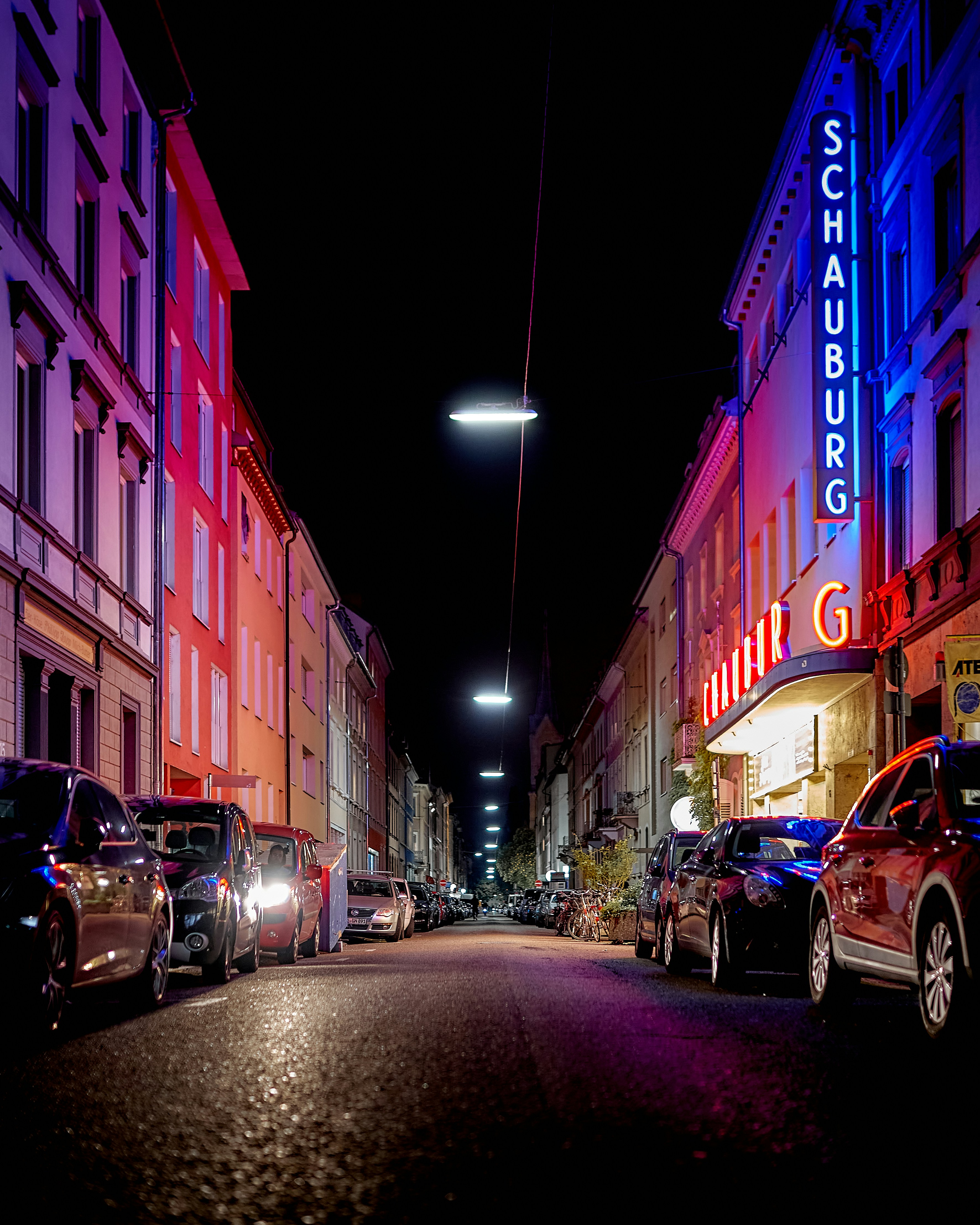 Neon Corridor: A Night Street Vanishing Point