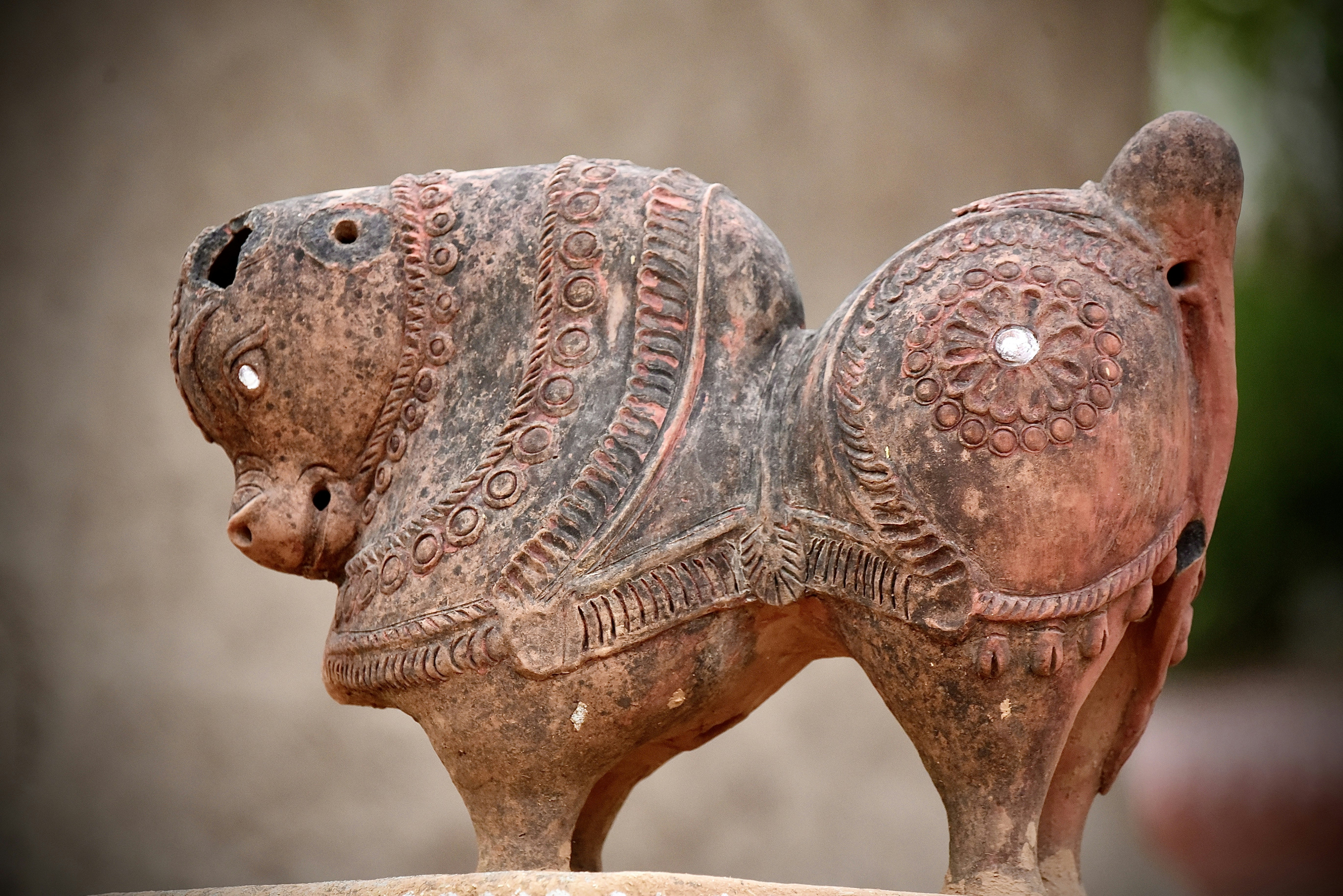 Whorled Echo: A Terracotta Horse in Quiet Light