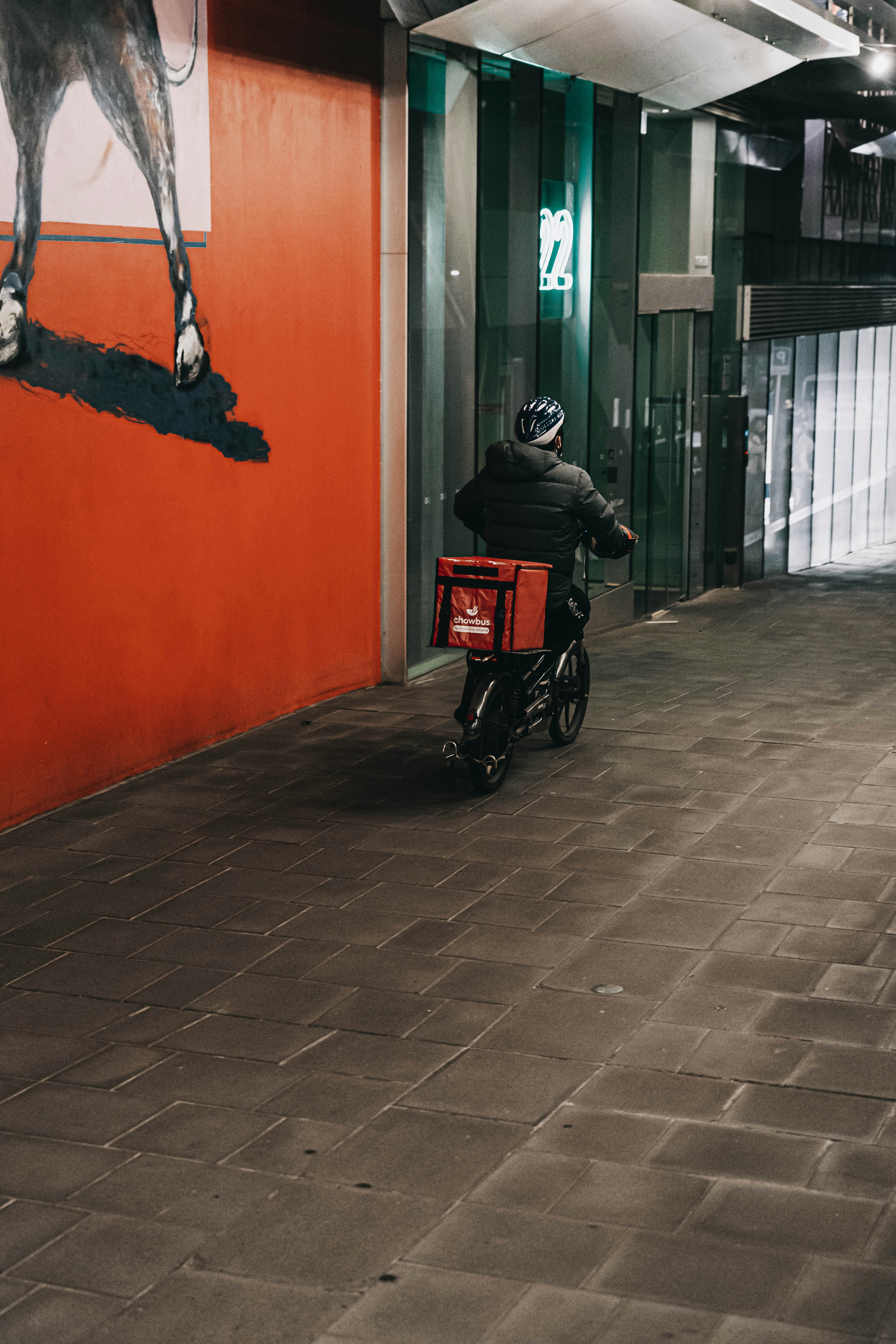 Guy on a scooter delivering food