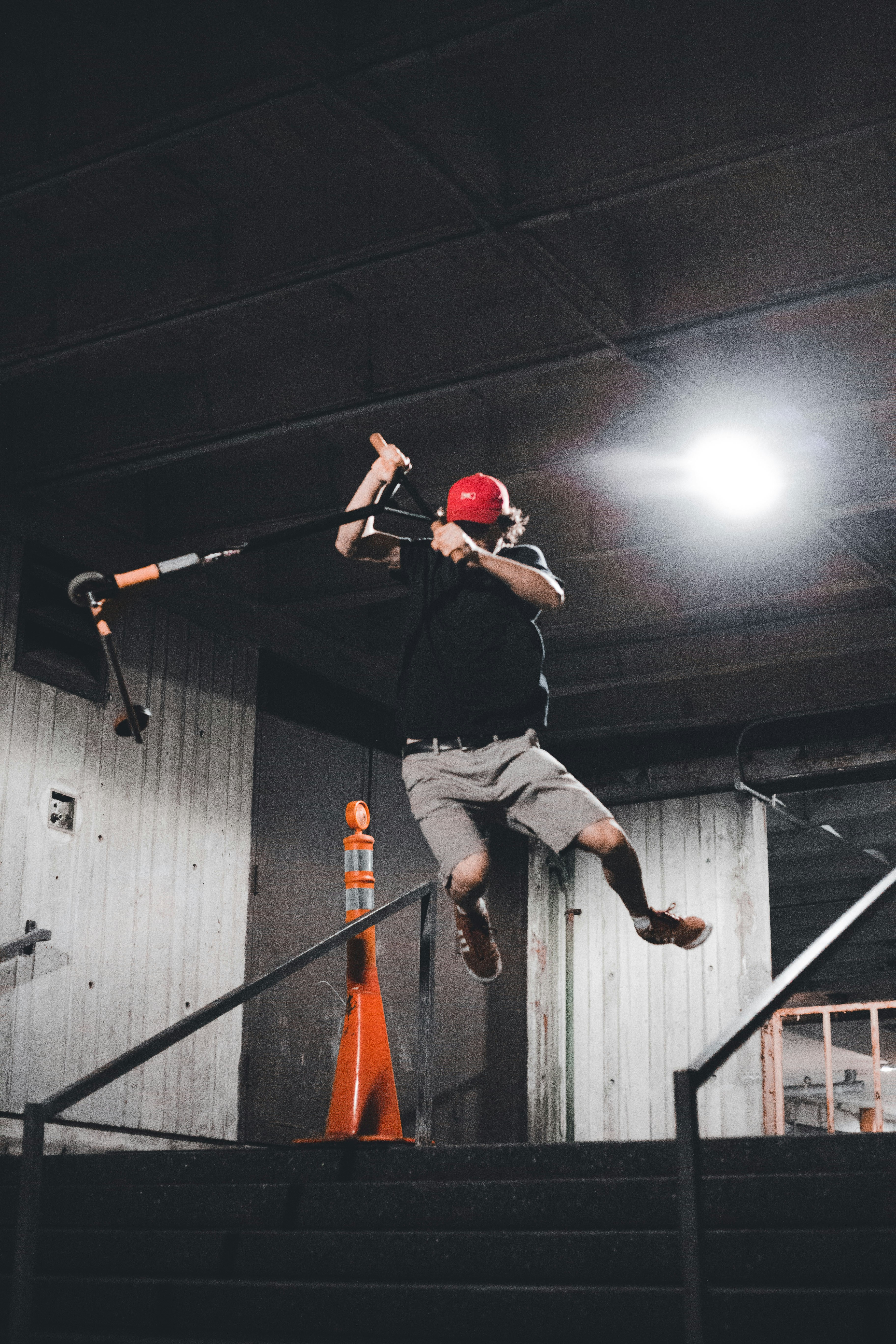 A person jumping with a baseball bat photo – Free Human Image on Unsplash