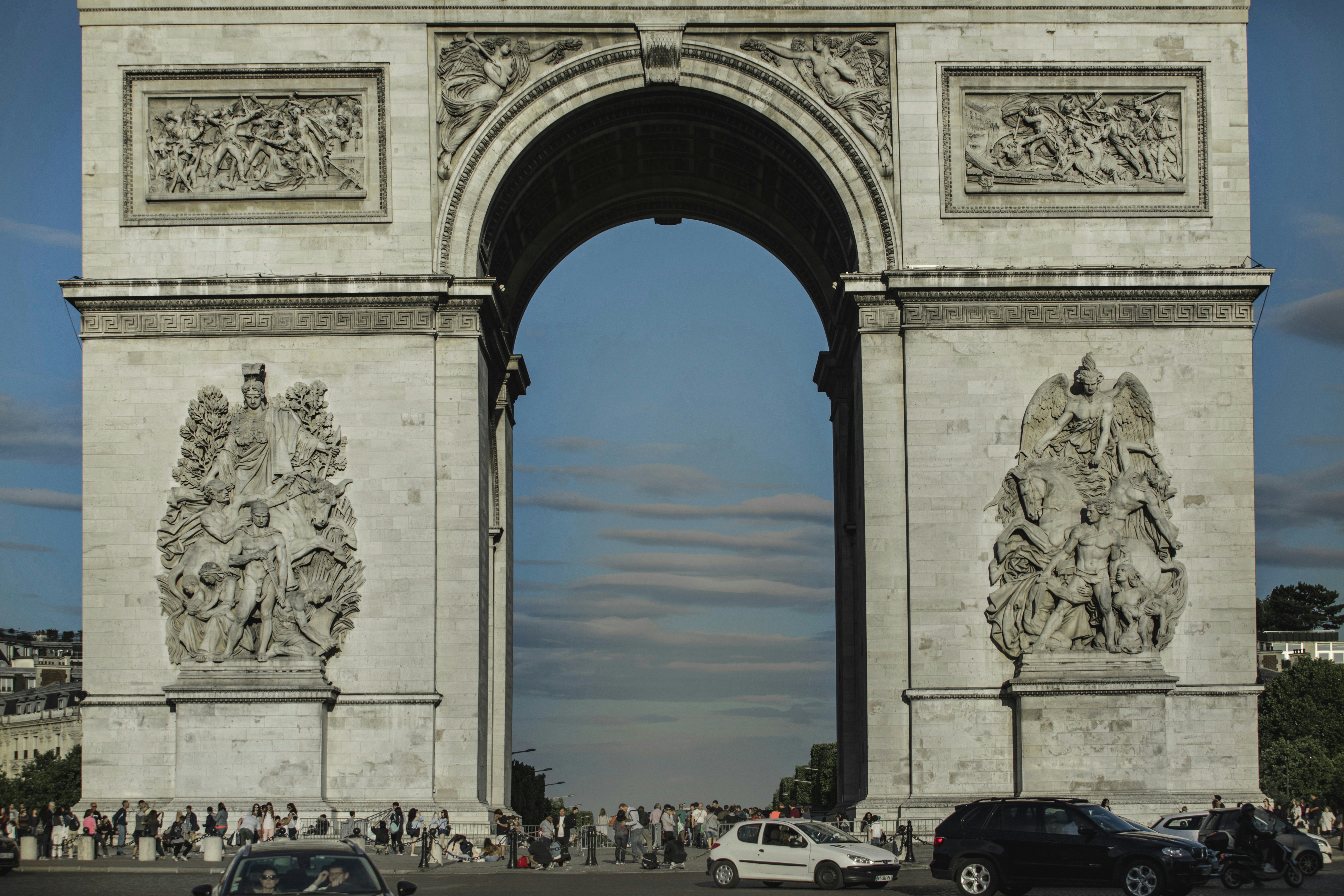 A large stone arch with statues photo – Free Building Image on Unsplash