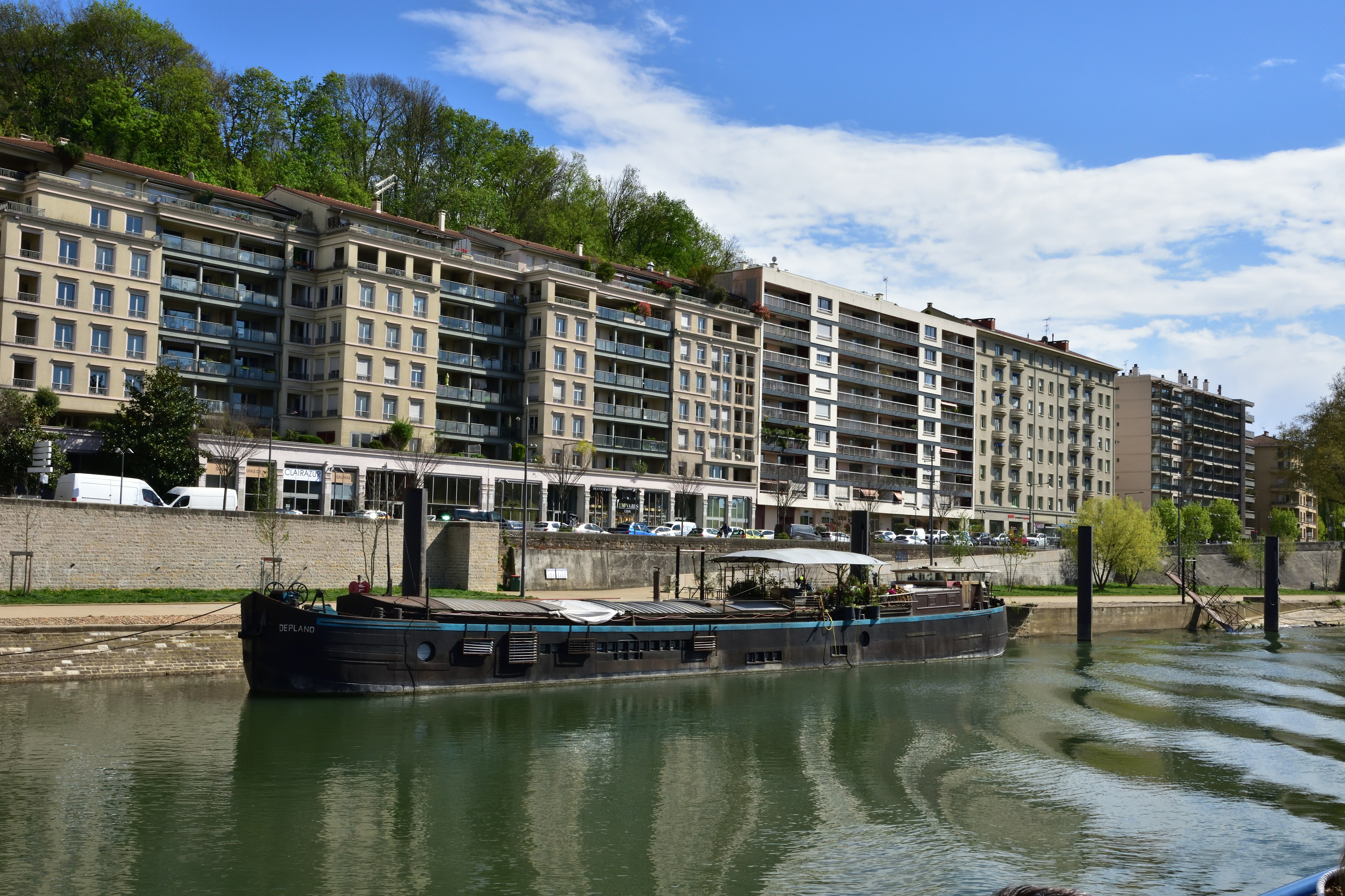 Barge by the Riverside: Quiet Blend of Water, Sky and Modern Living