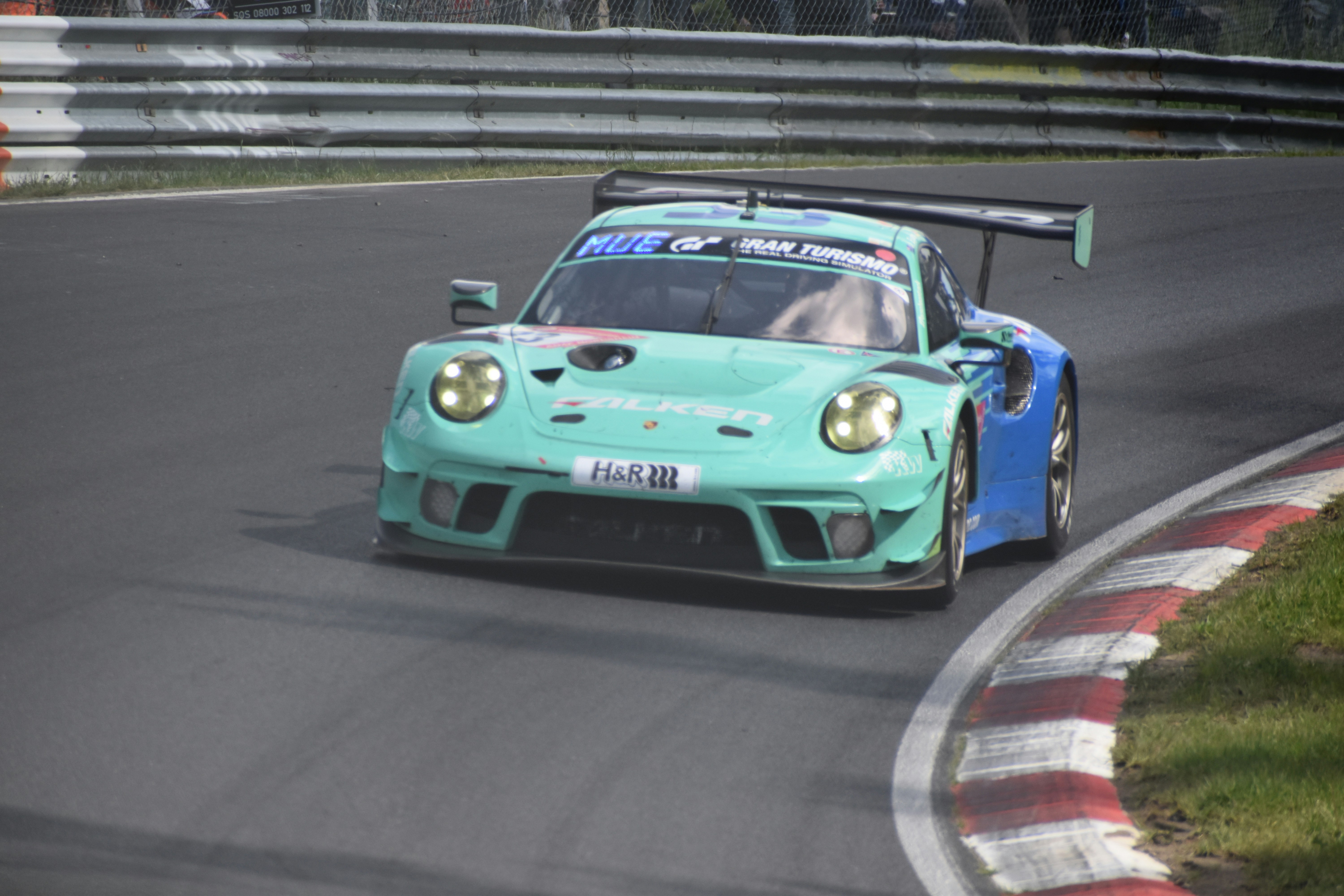 A blue race car on a track photo – Free Nürburgring Image on Unsplash