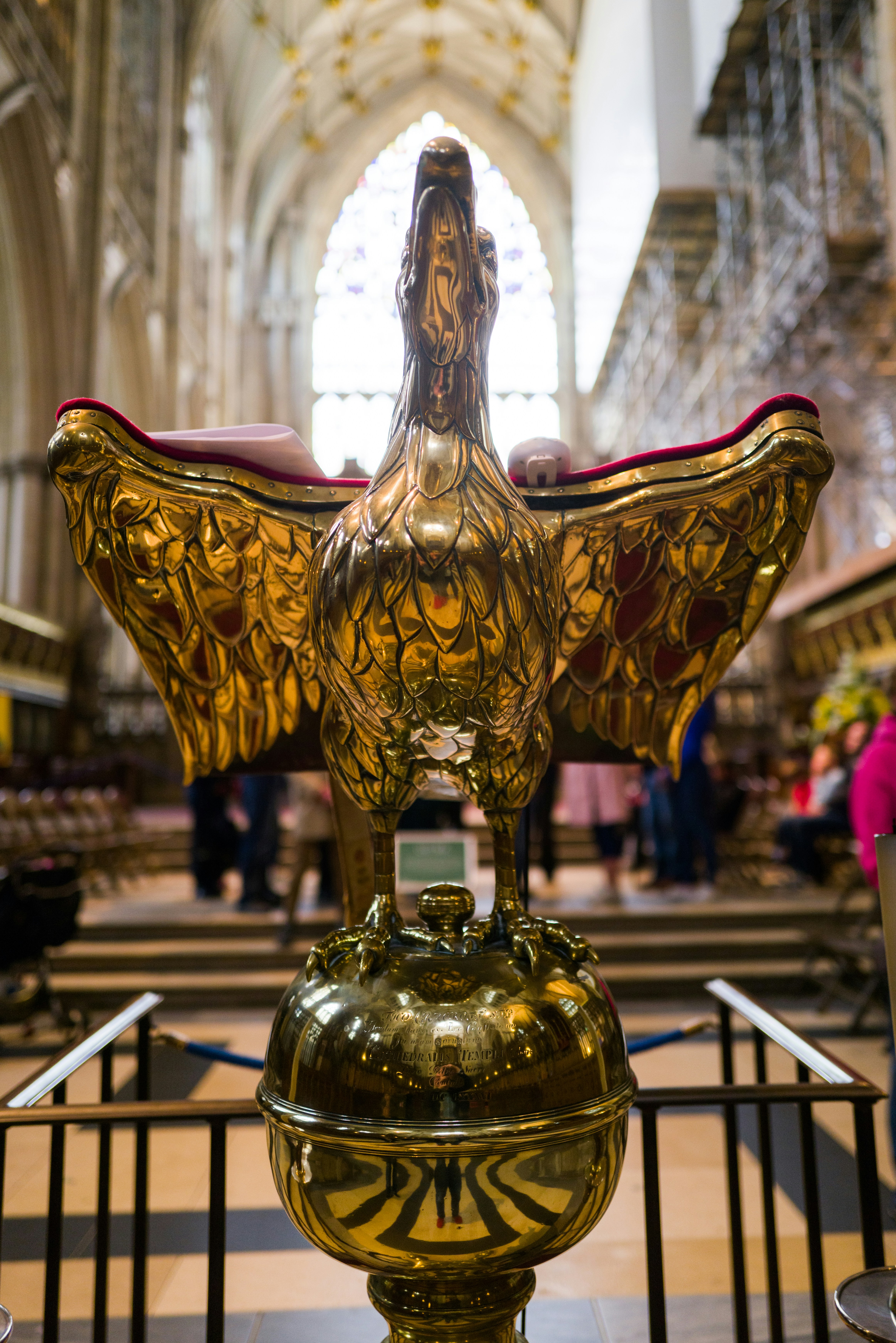 Gilded Wings of Light: The Cathedral's Central Eagle on a Shining Orb