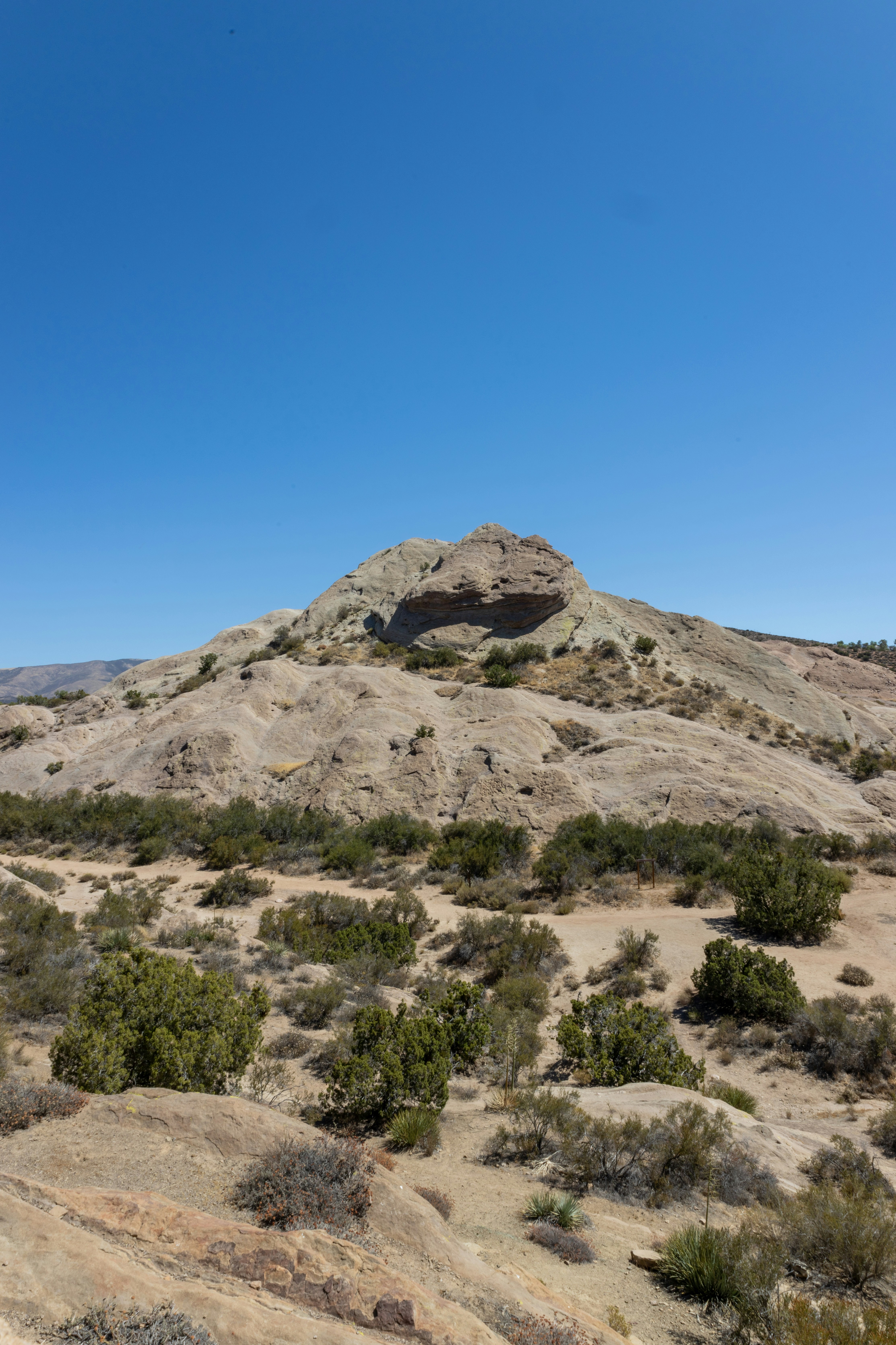 The Sentinel of Stone Under a Cerulean Noon