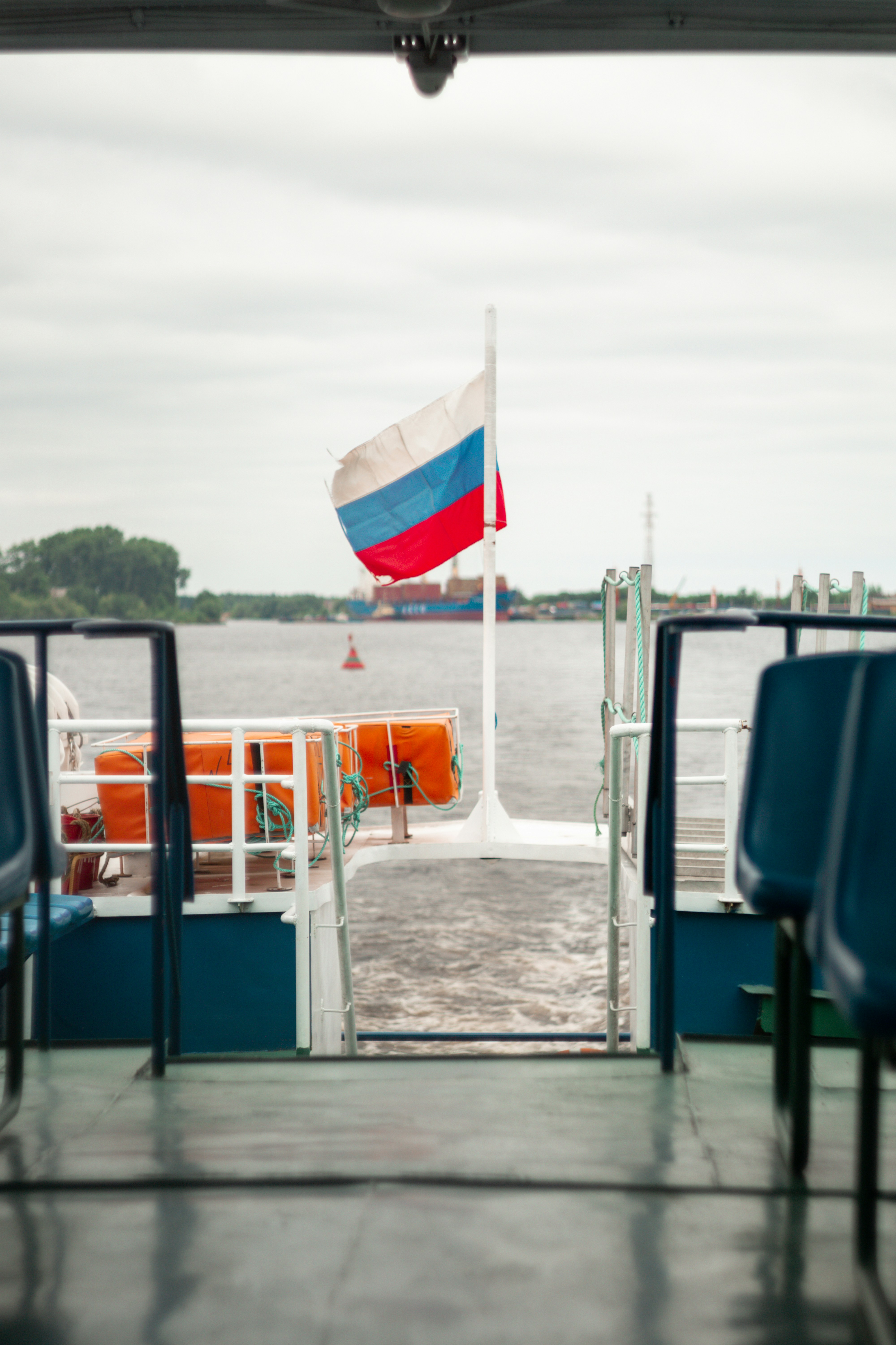 Flag Over the Deck: A Departure Wake from the River