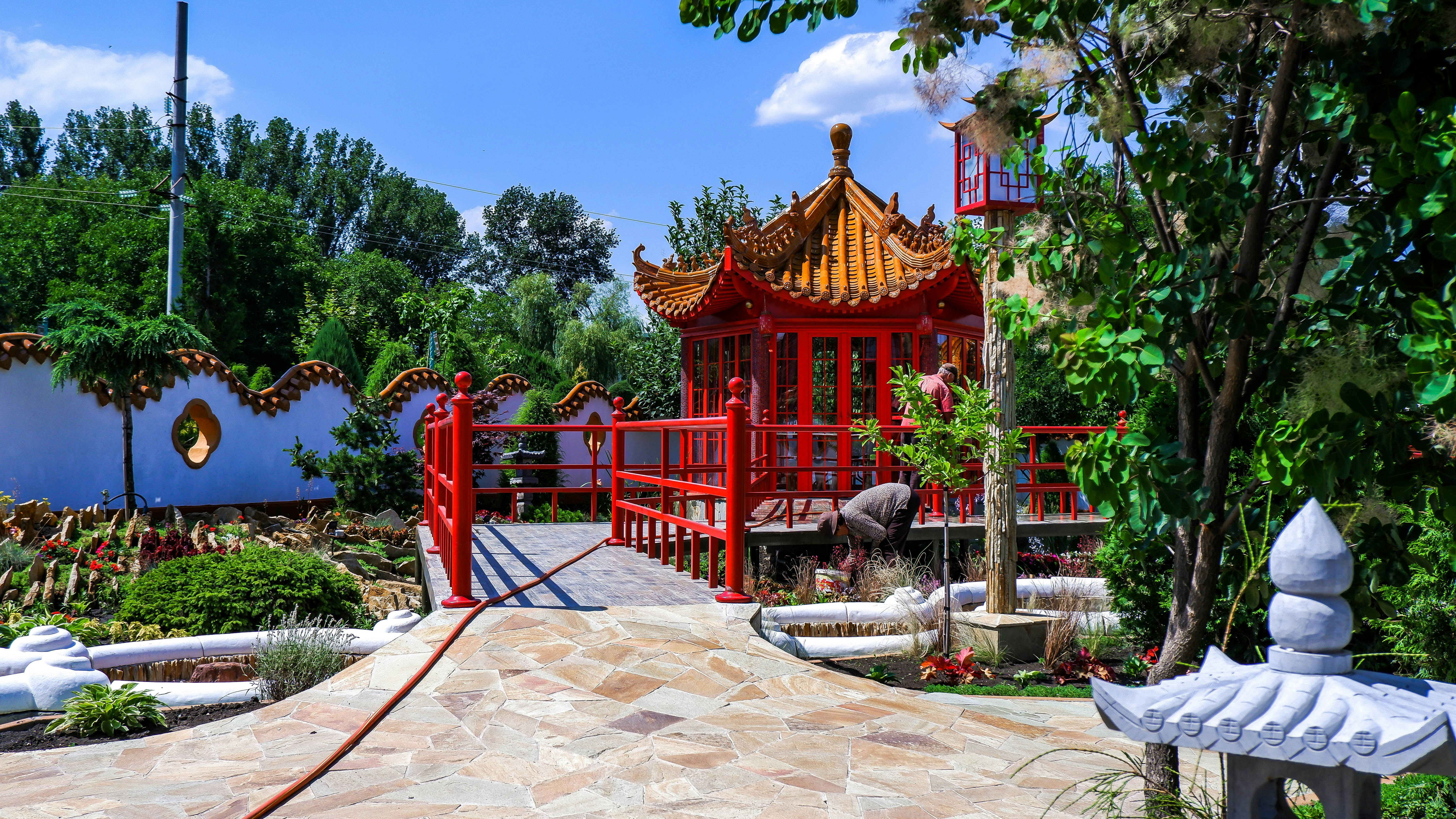 Red Pavilion at the Heart of a Tranquil Chinese Garden