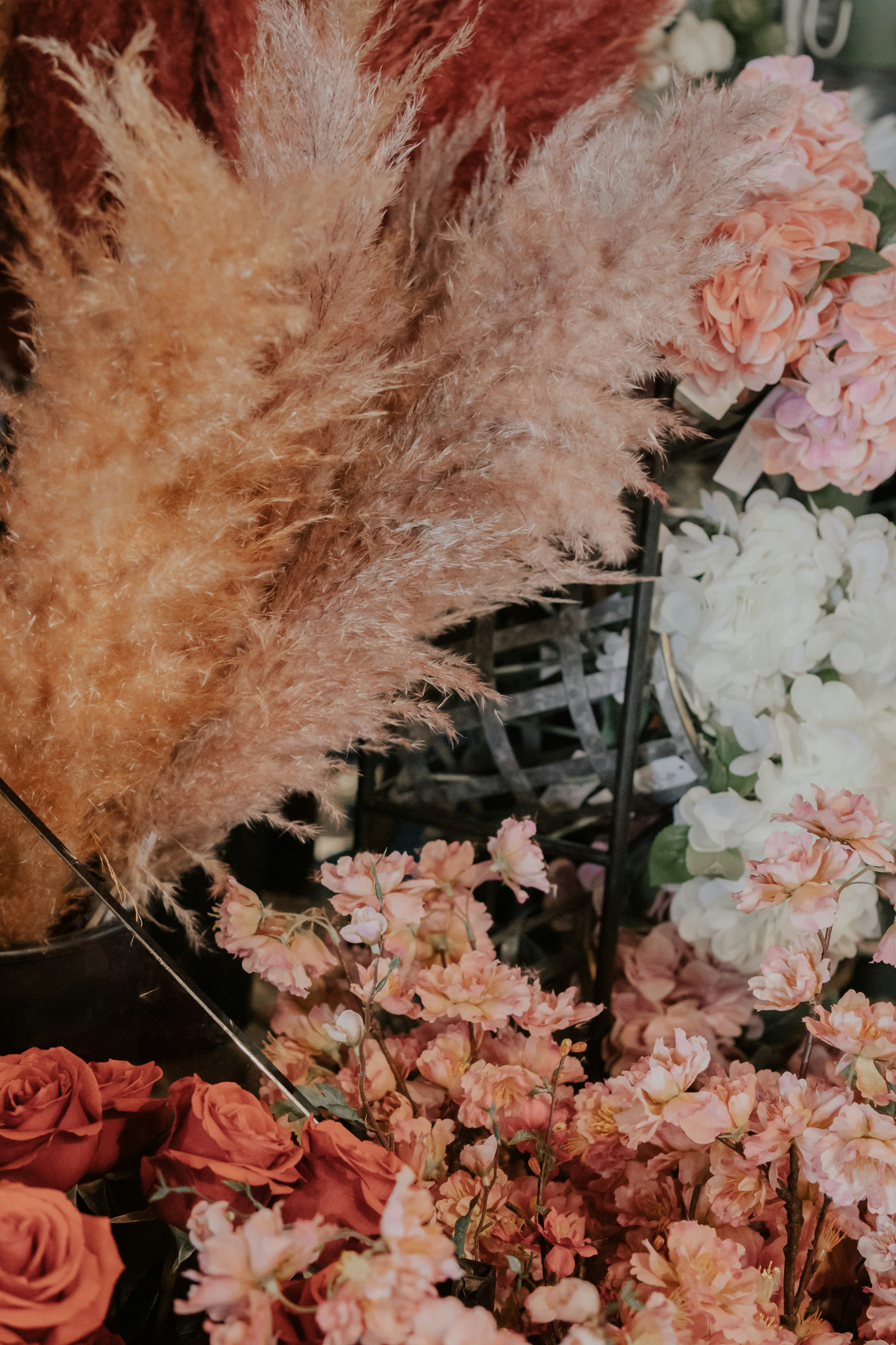 Amber Pampas Framing a Rosy Floral Tableau