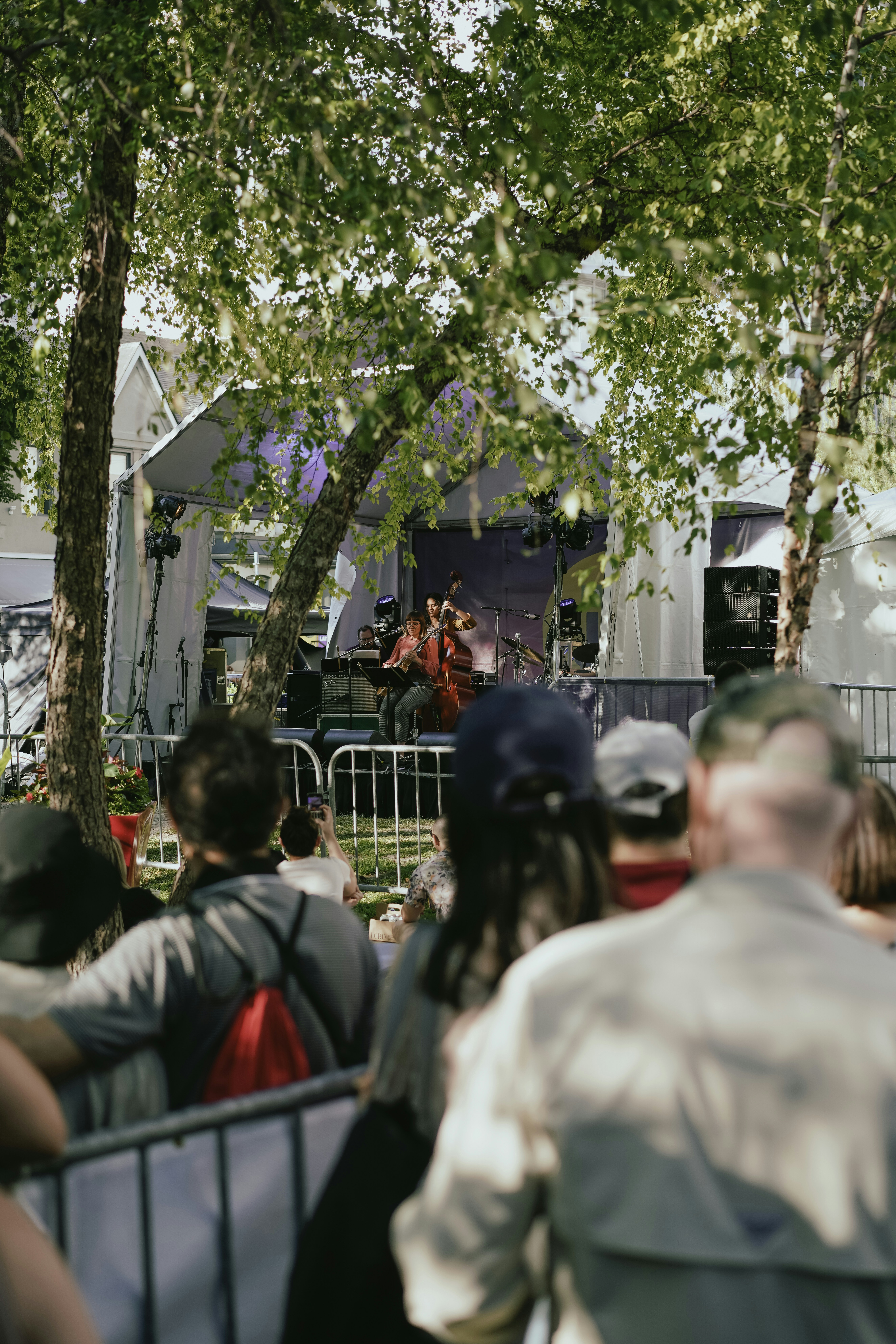 A group of people watching a band on stage photo – Free Toronto Image ...