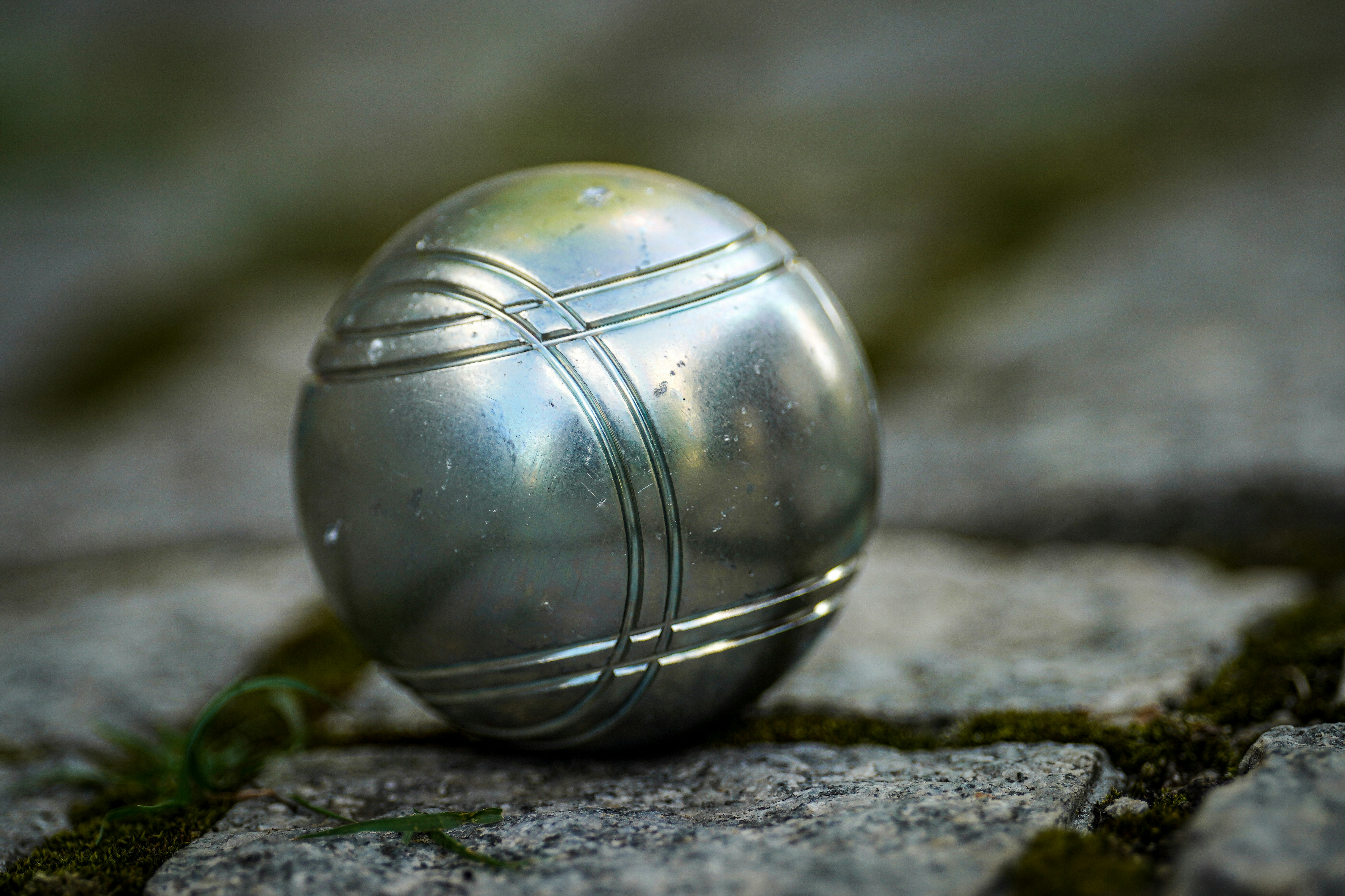 a glass sphere on a rock