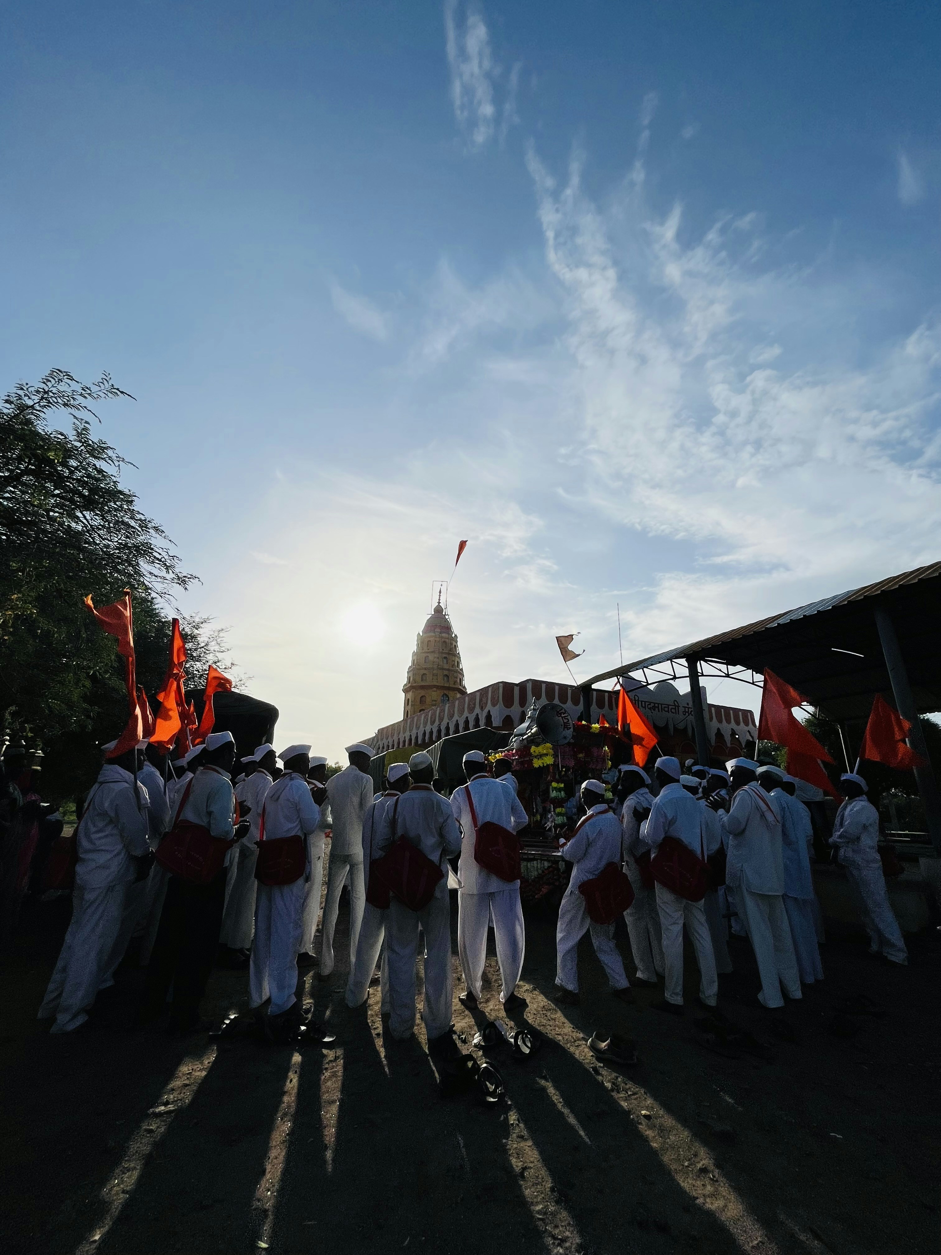 A group of people in white robes holding flags photo – Free Ahmednagar ...
