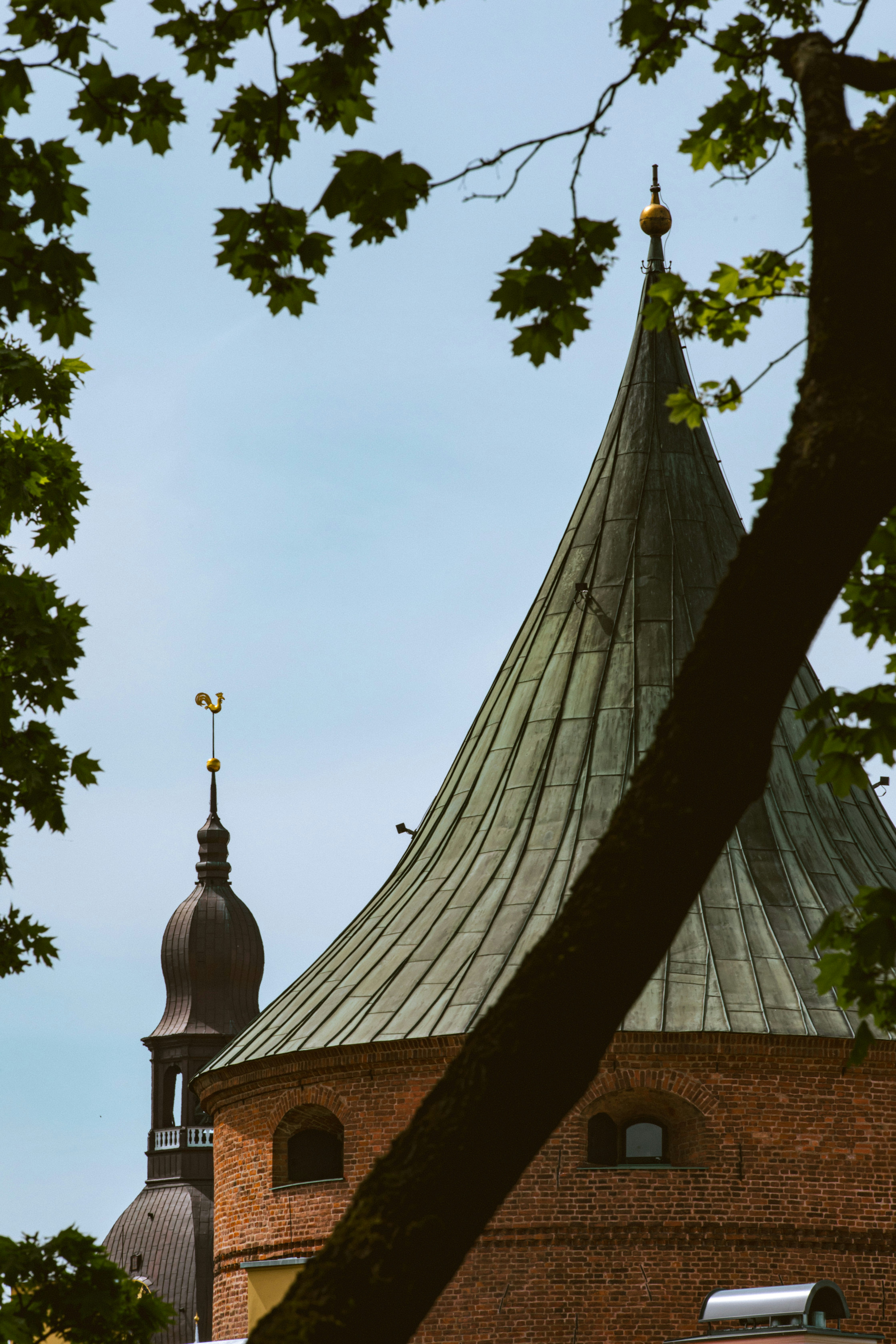 A tall pointed tower photo – Free Riga Image on Unsplash