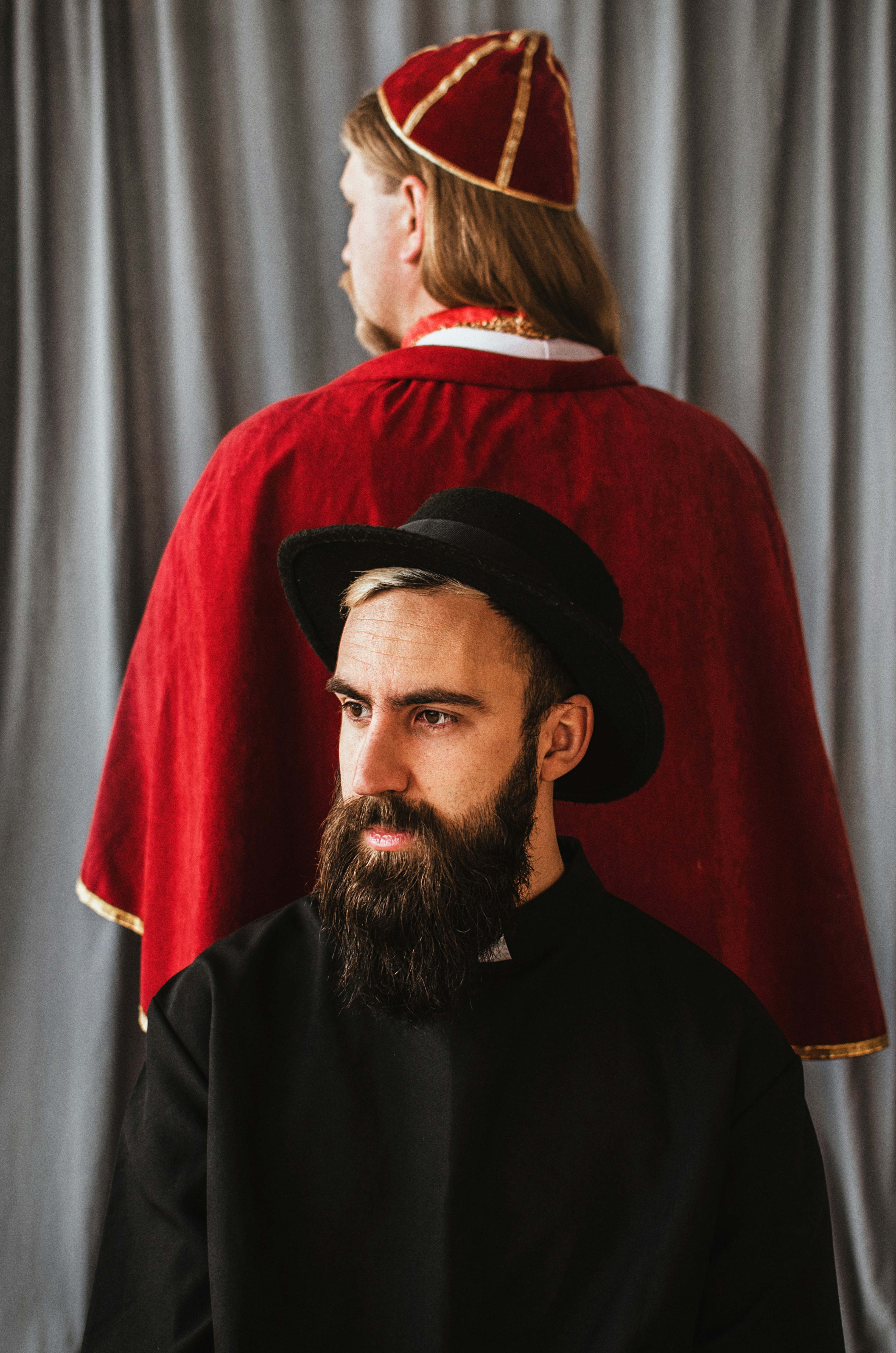 Velvet Cloak, Bearded Gaze: A Dual-Paced Portrait