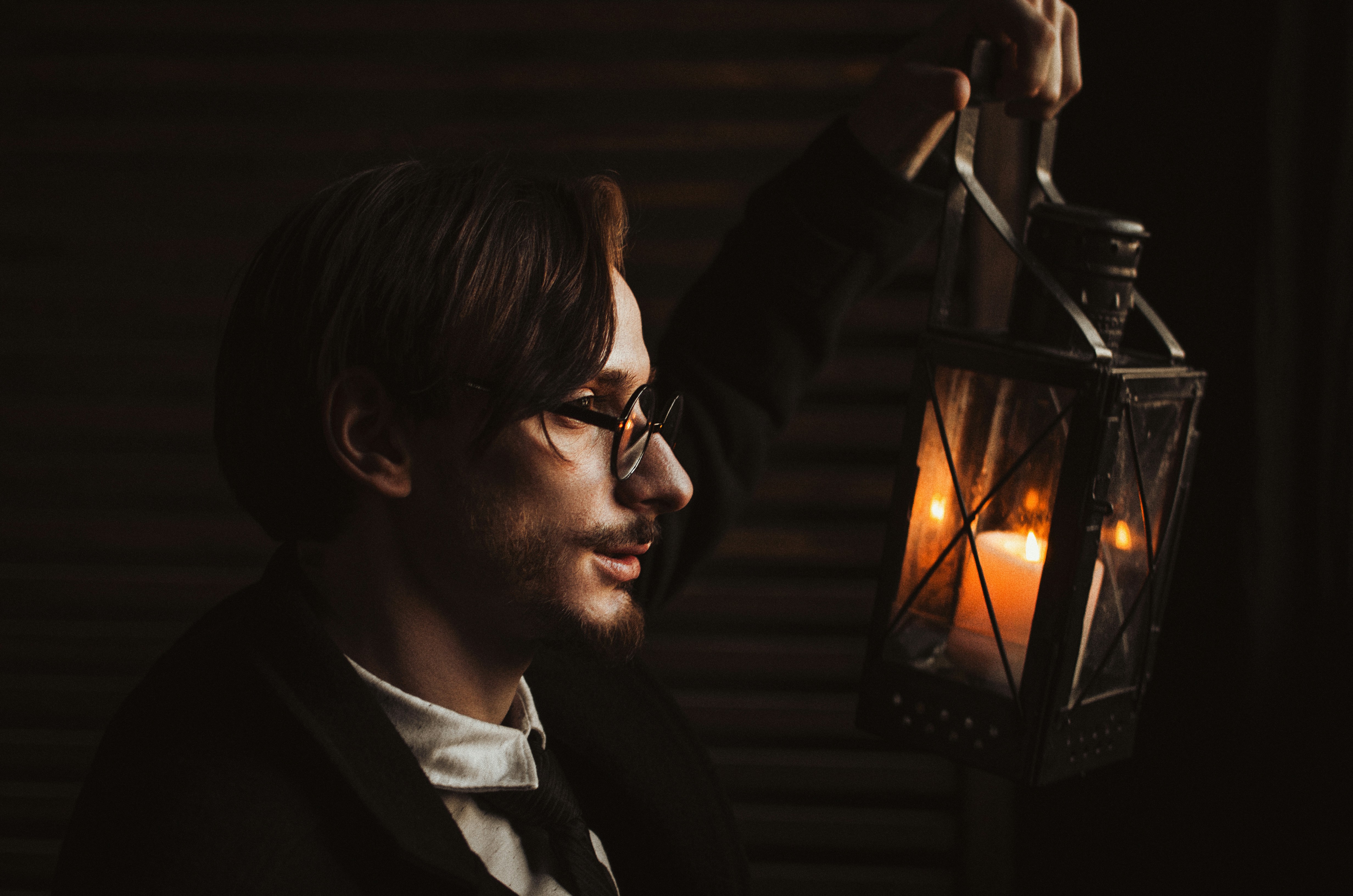 Lantern Glow: Portrait Beneath the Hanging Light