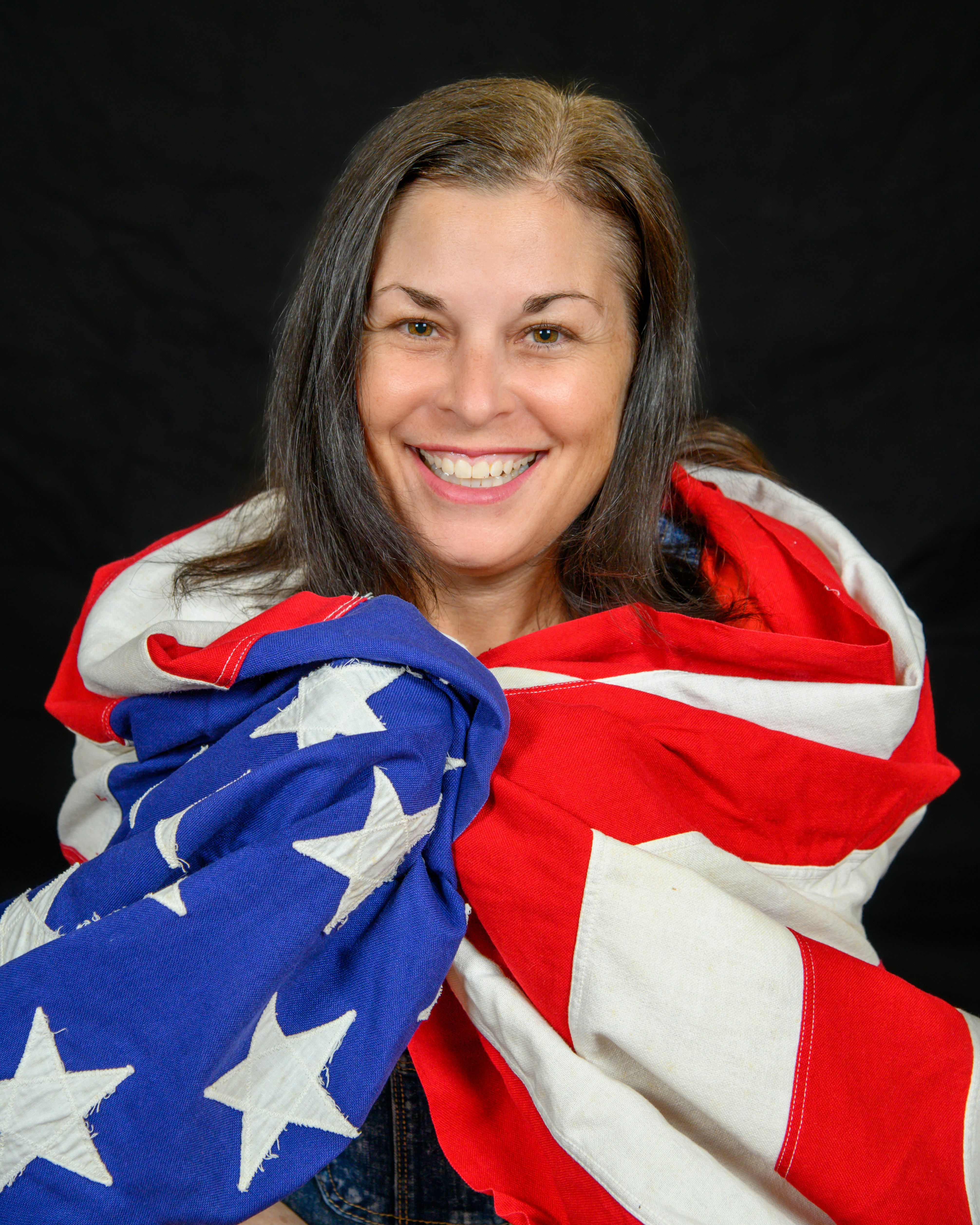 Patriotic Portrait: Smiles Wrapped in Stars and Stripes