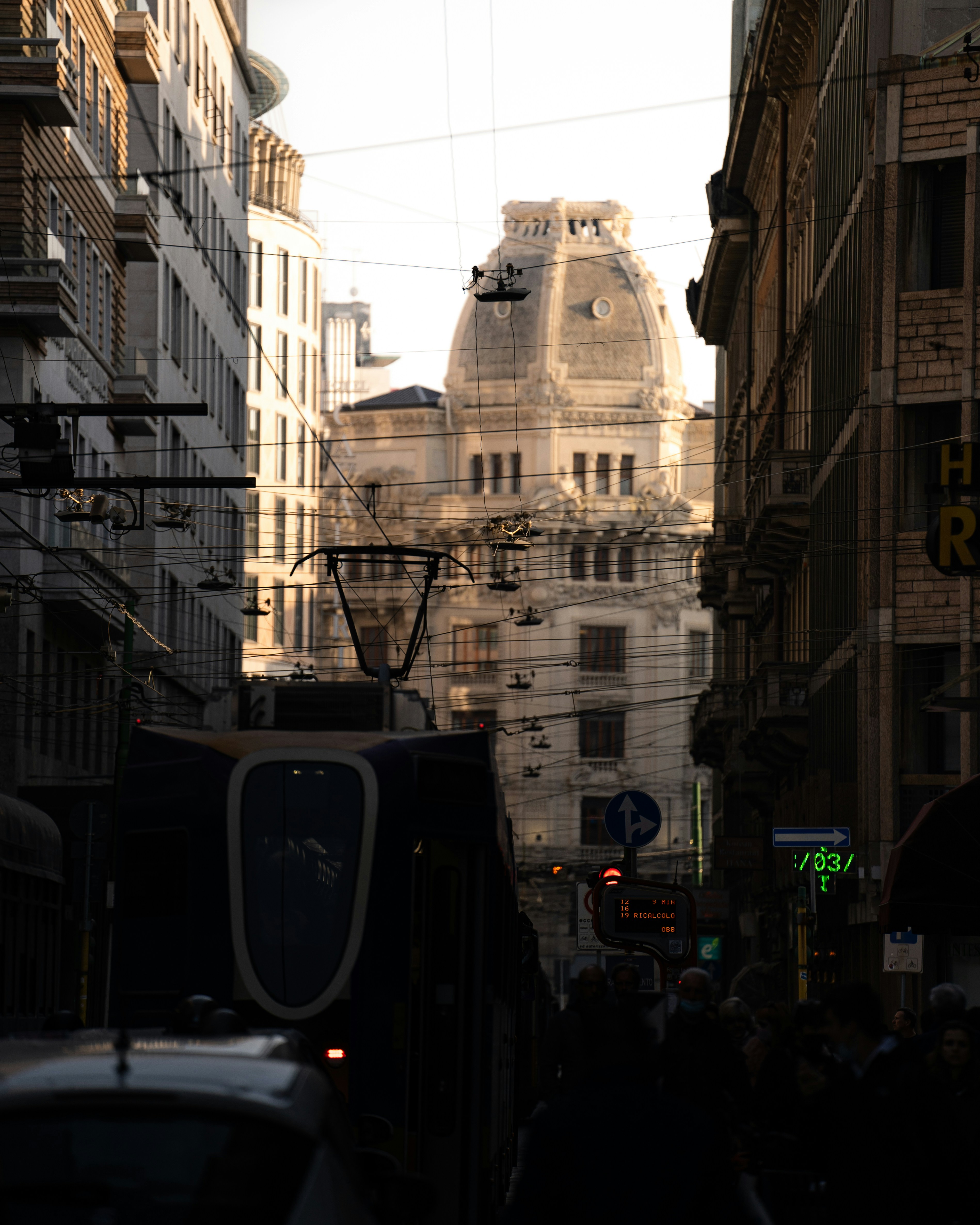 Dome in the Wires: Sunlit Heritage Framed by Urban Tram Networks
