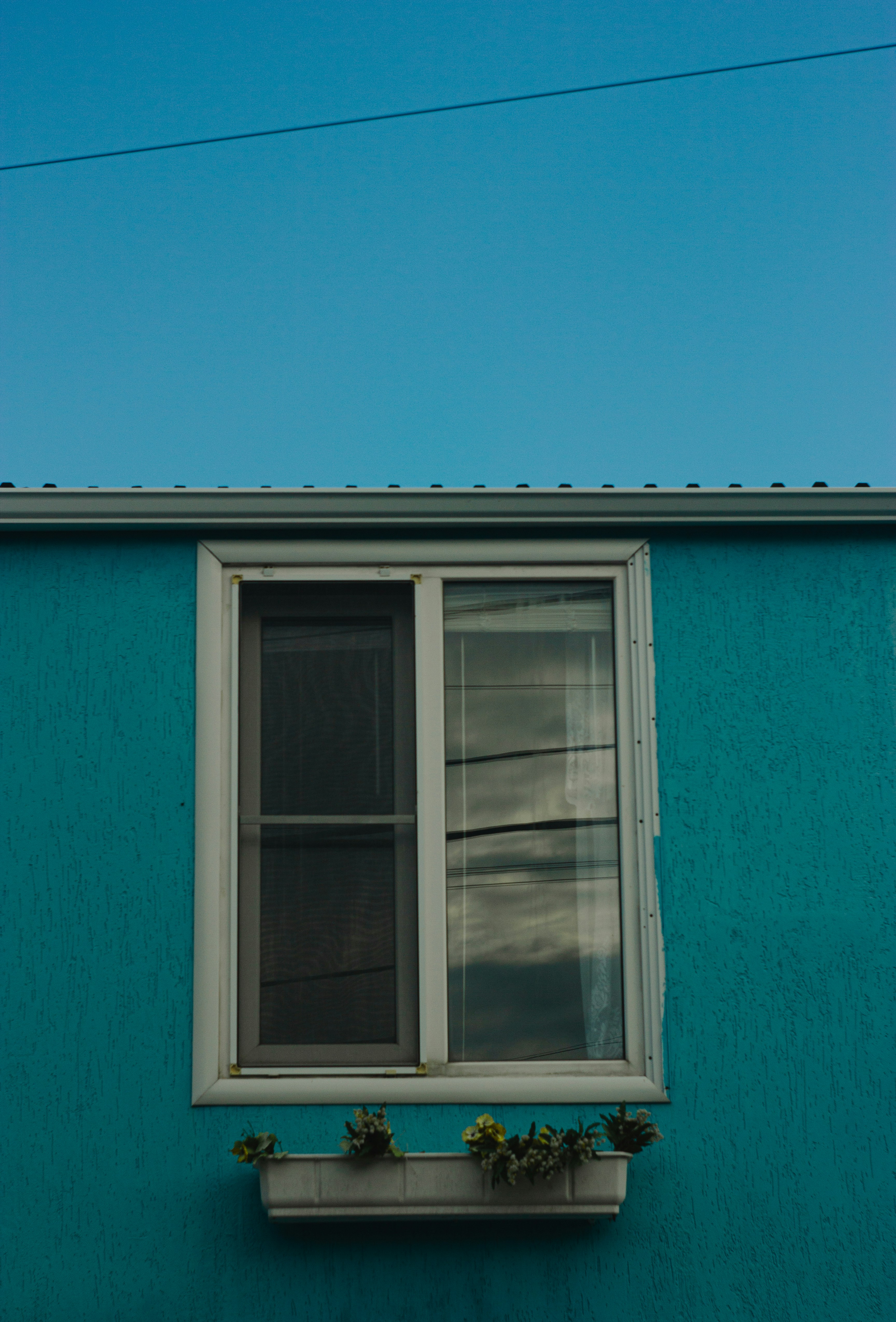 a window with a planter box