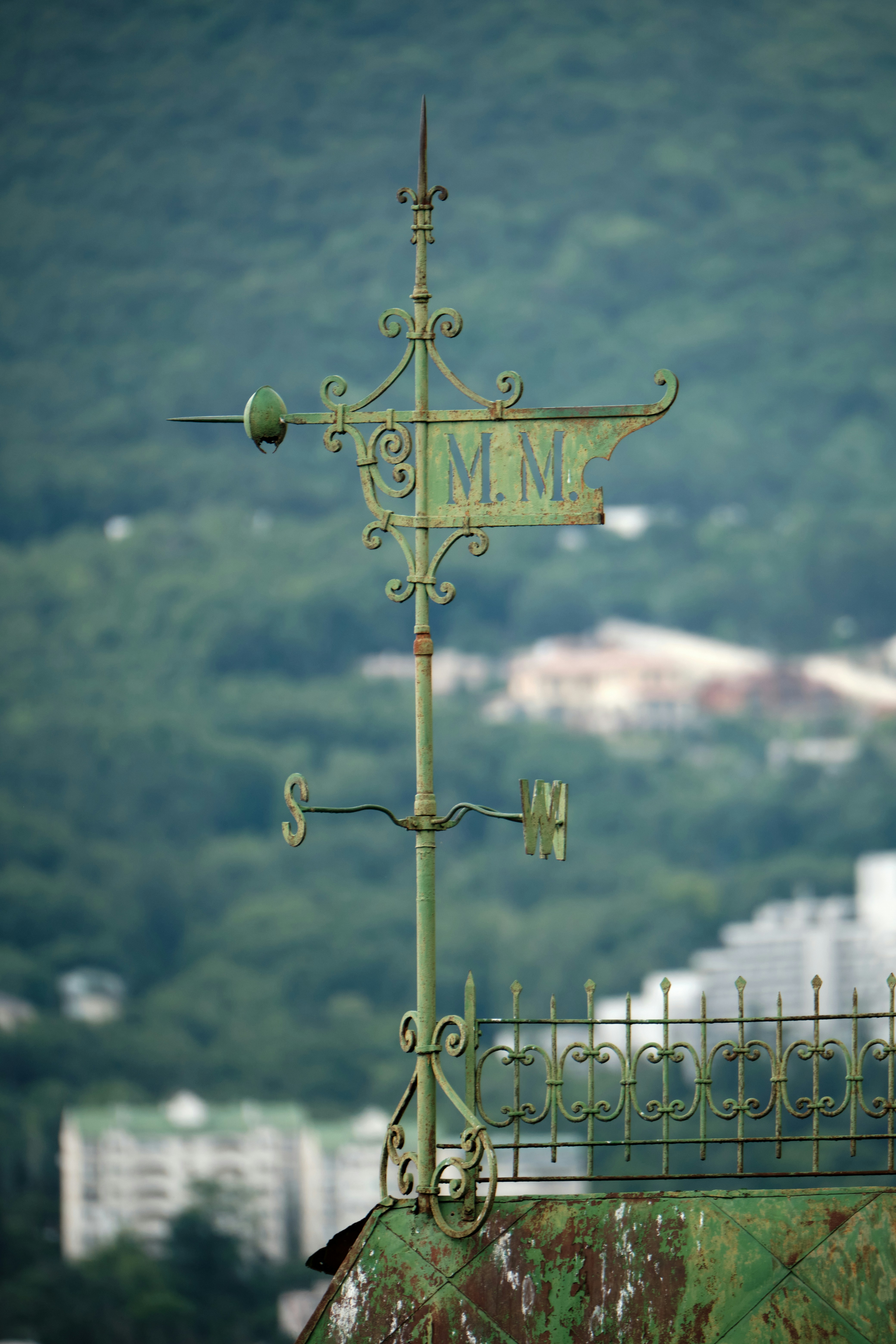 a gold and green tower
