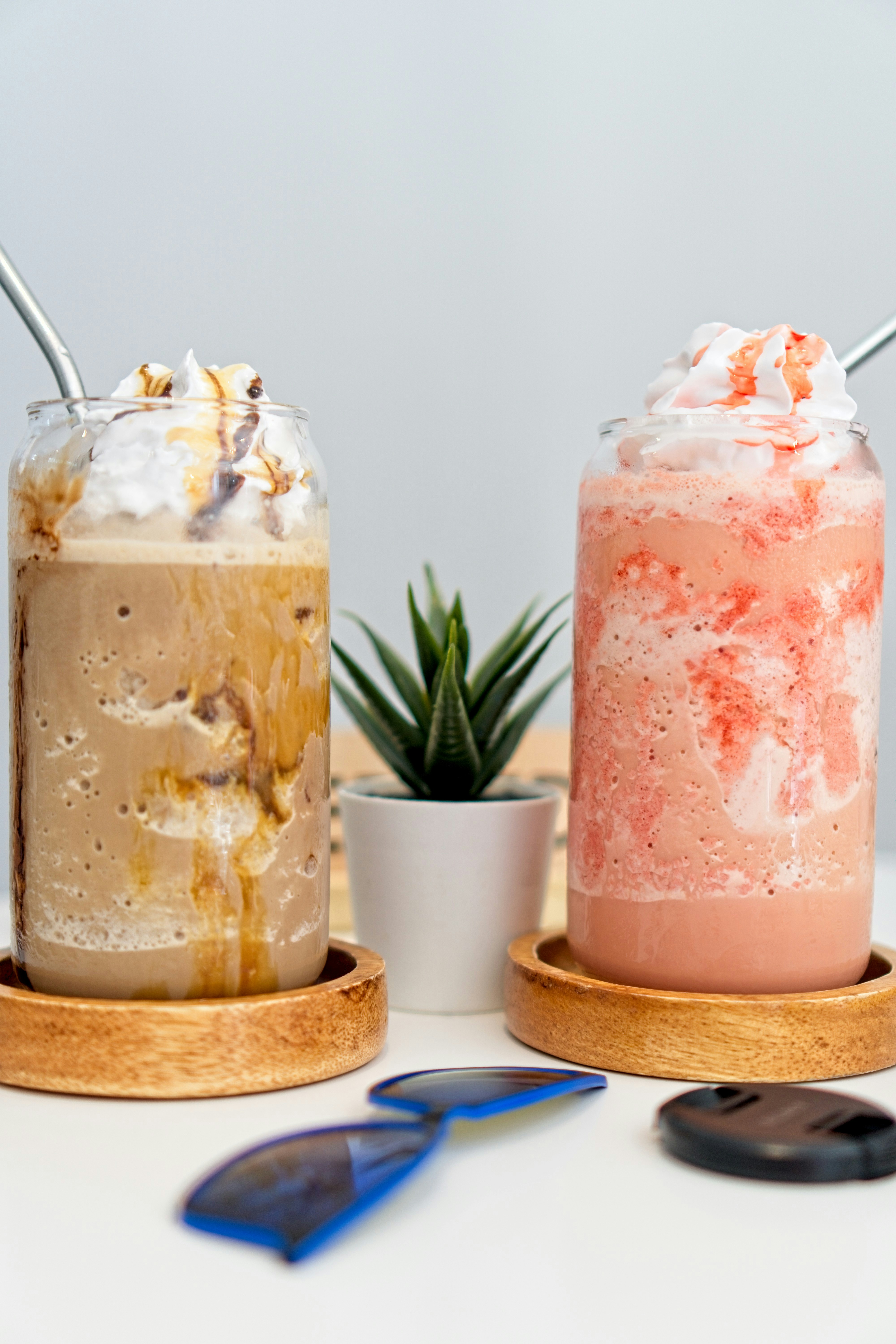 Caramel Drizzle Latte and Pink Strawberry Shake: A Minimalist Drink Duo