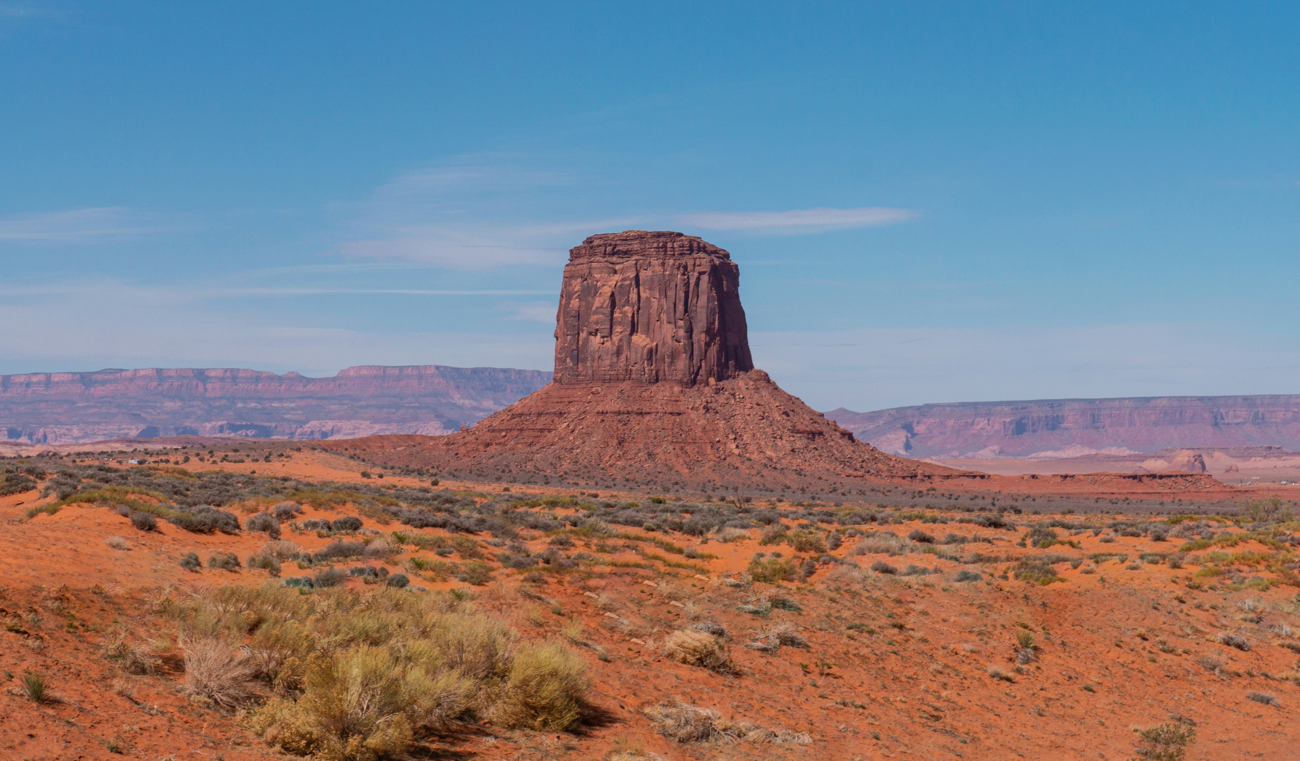 A desert landscape with a rock formation photo – Free Monument valley ...