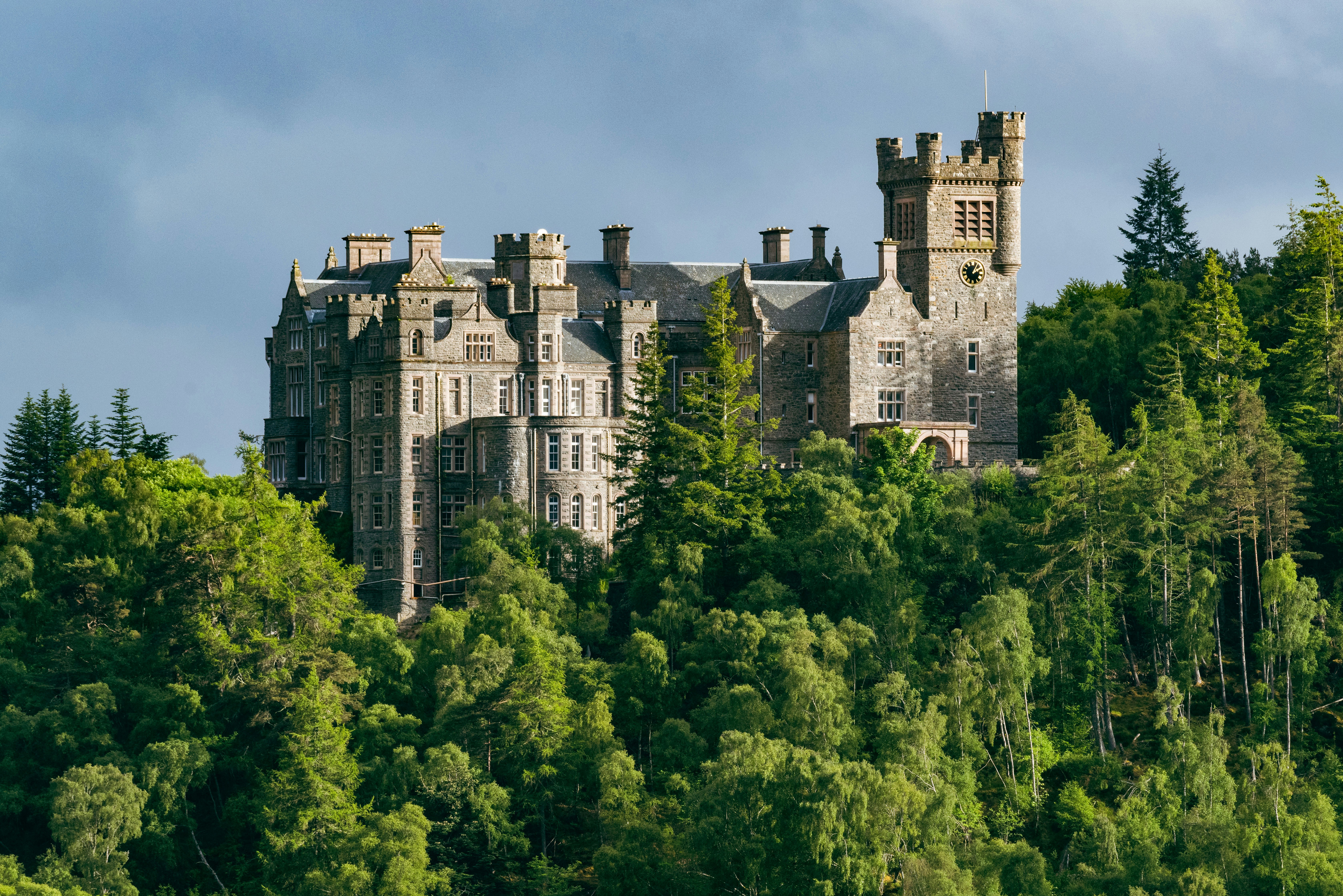 A large castle on a hill photo – Free Castle Image on Unsplash