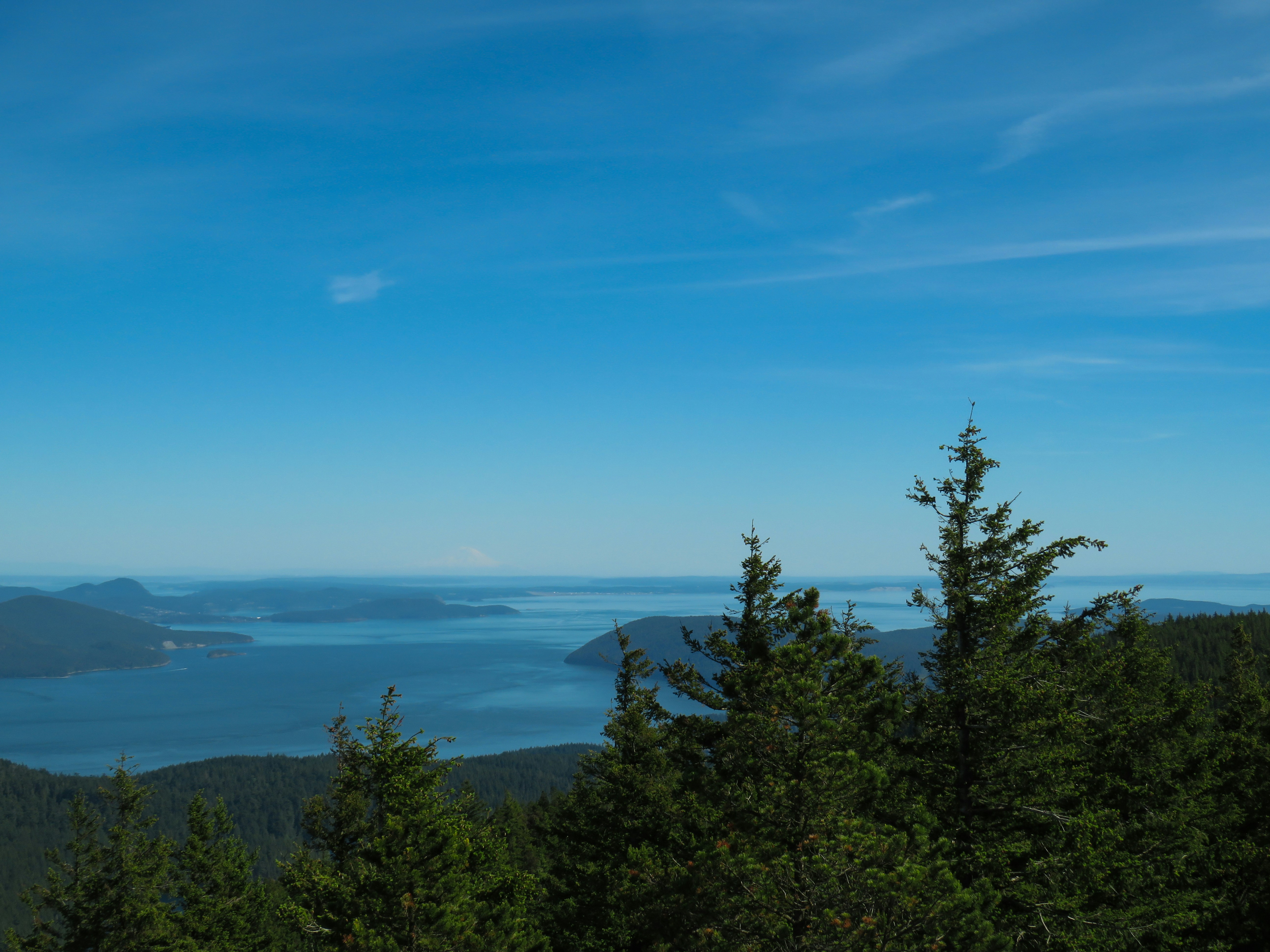 A view of a lake and trees photo – Free Mount constitution Image on ...
