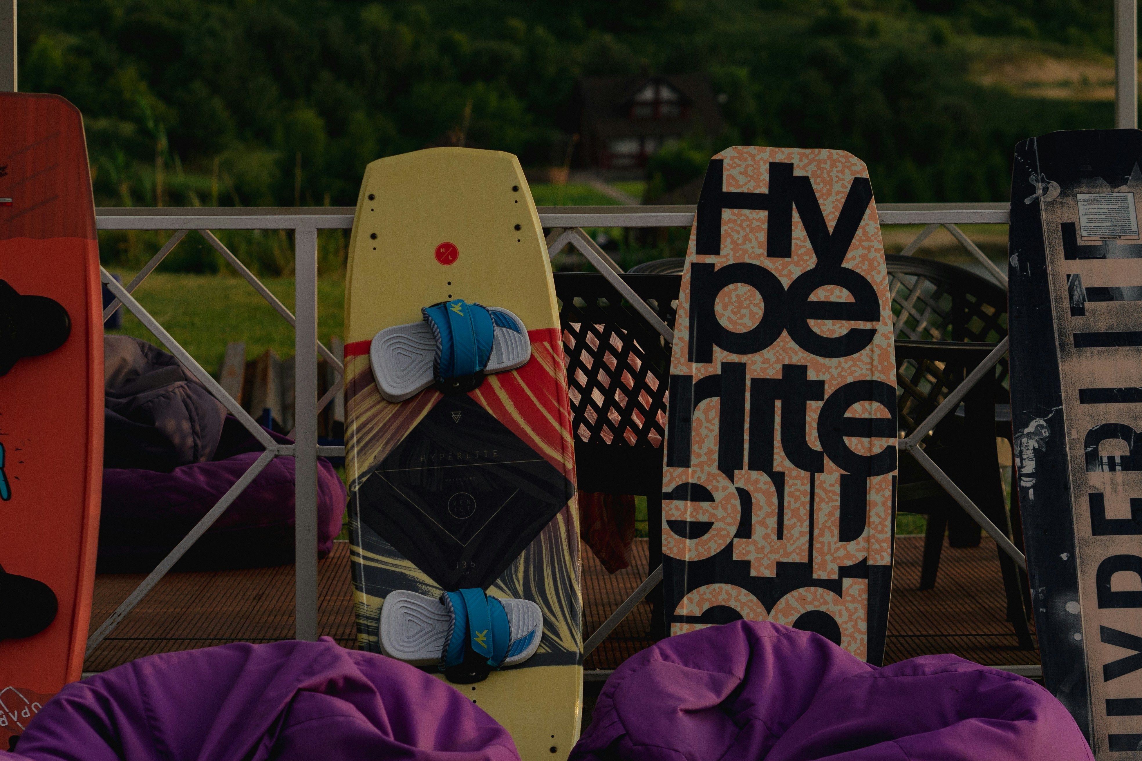 Colorful Snowboards Stand Tall in a Relaxed Gear Corner