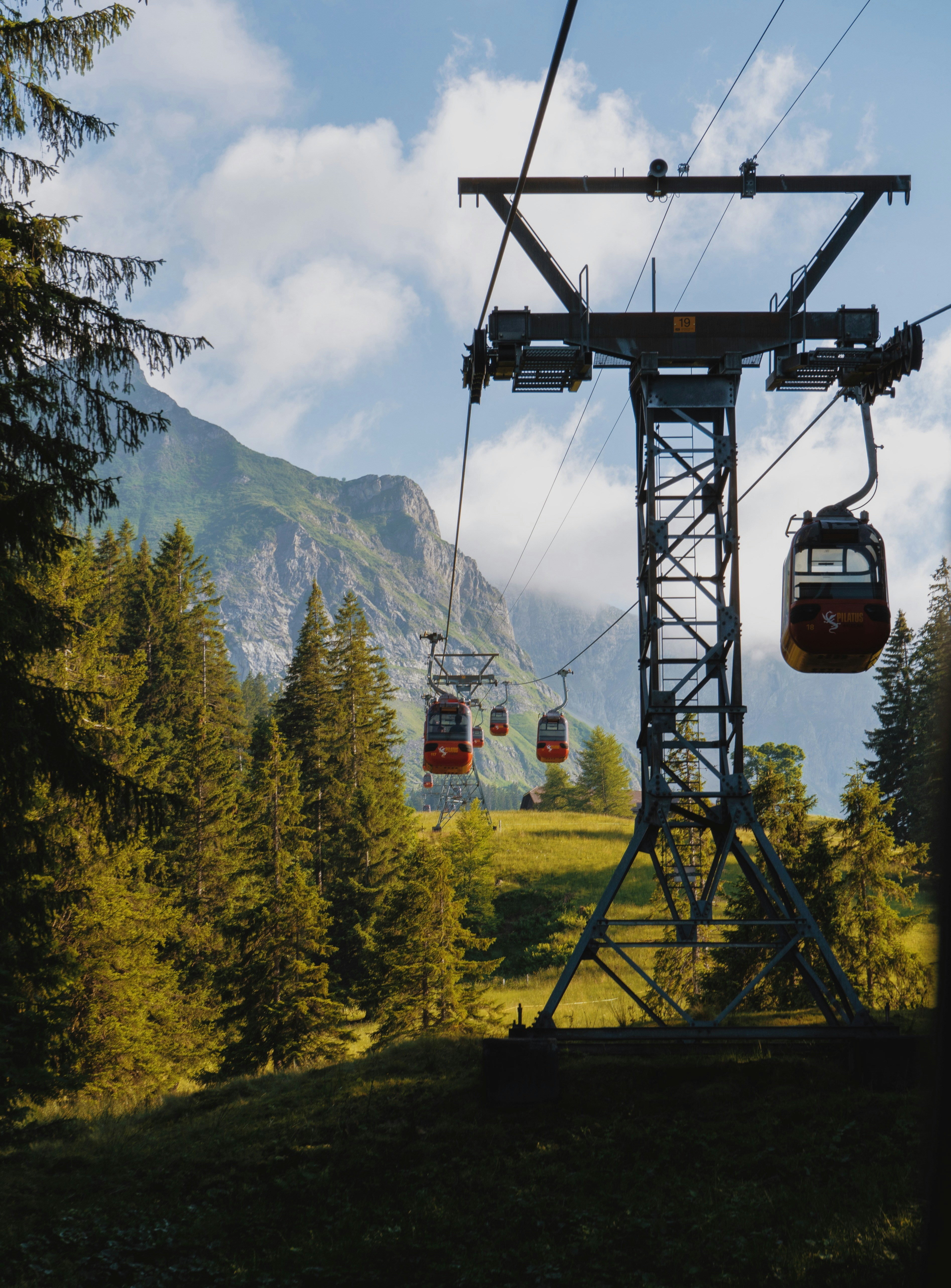 A group of people riding a cable car photo – Free Mount pilatus Image ...