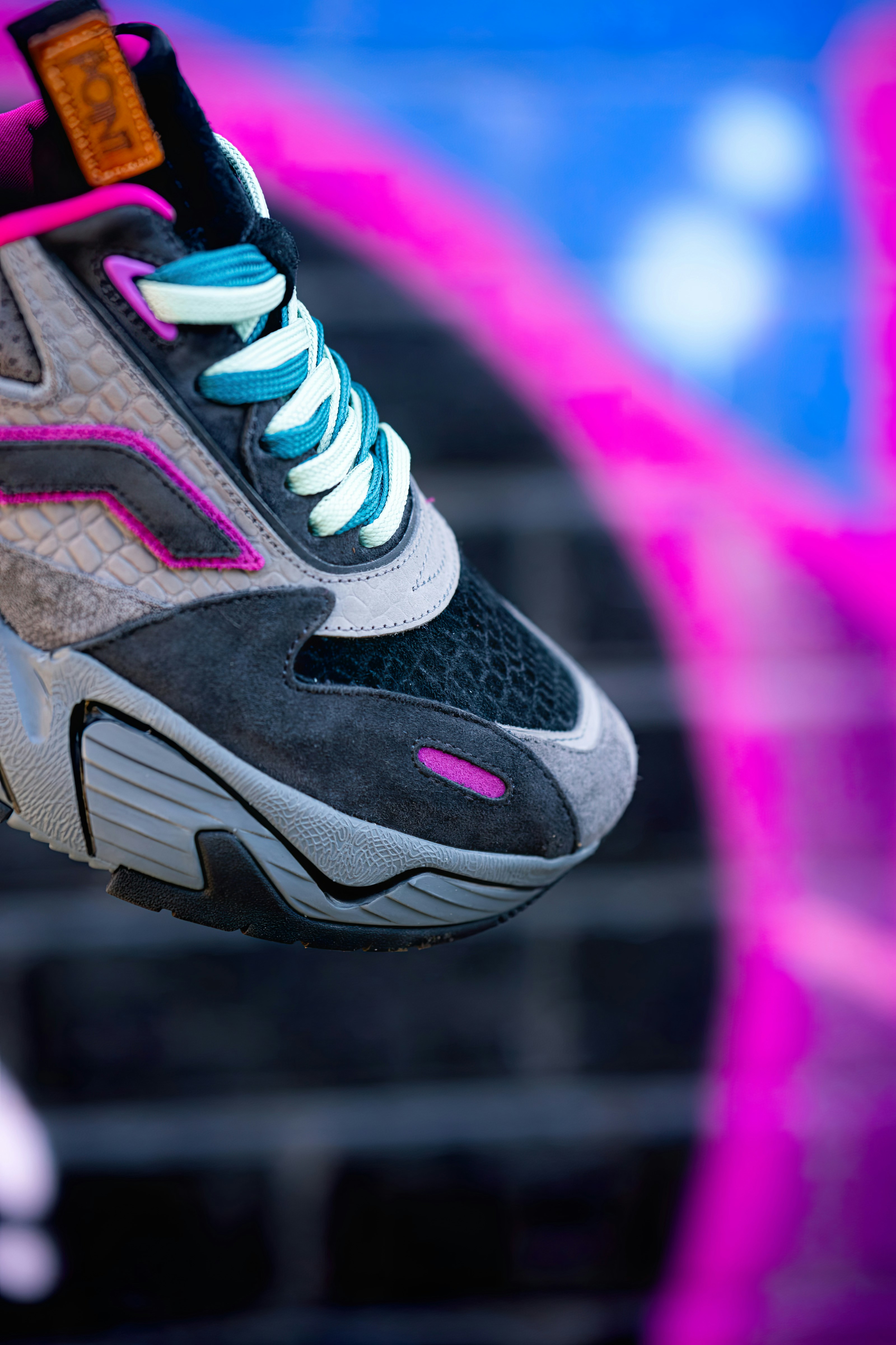 Step into the Neon Pedestal: A Chunky Sneaker in Motion