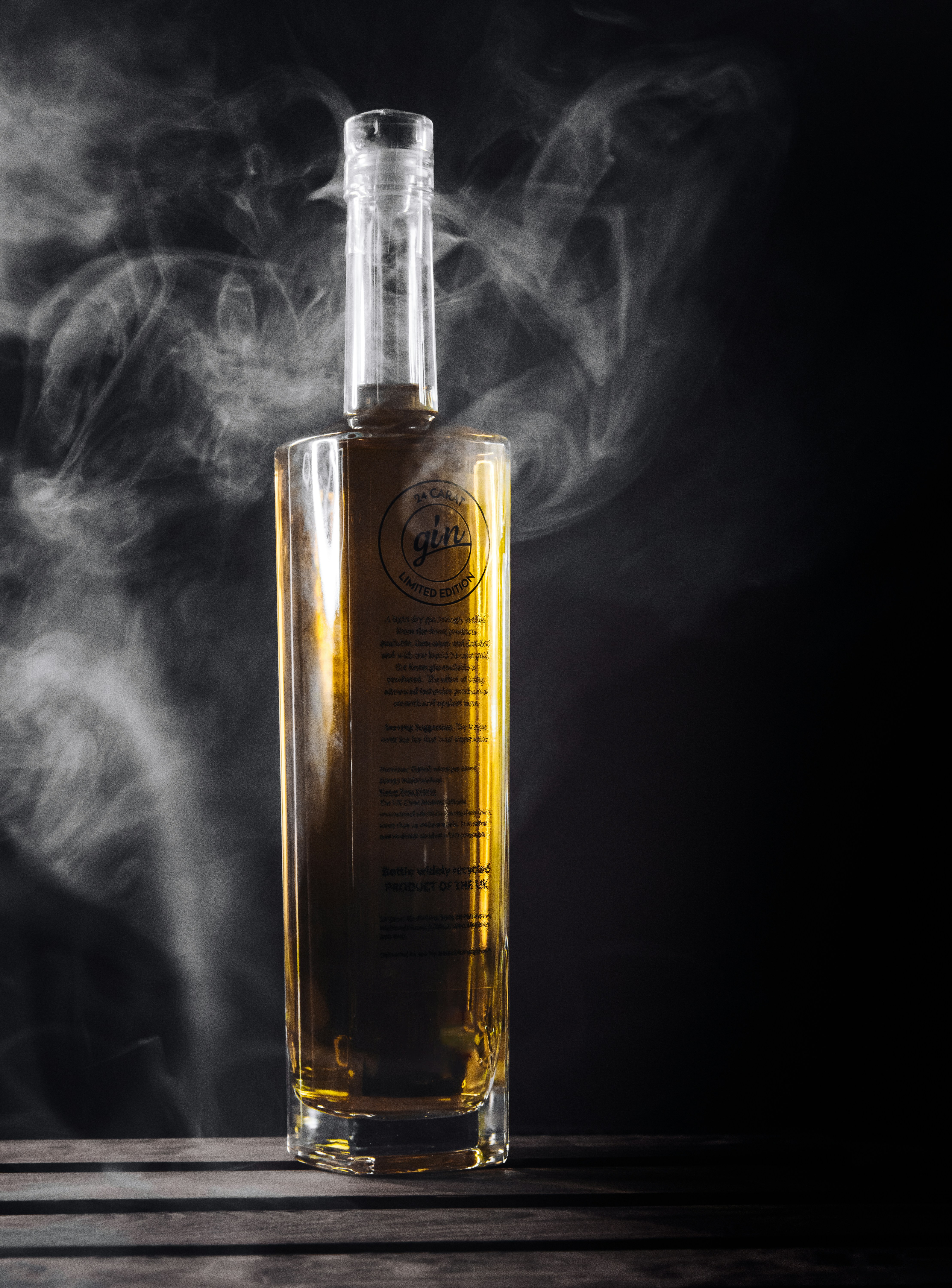 Elegant glass bottle filled with amber liquid, surrounded by swirling smoke against a dark backdrop.
