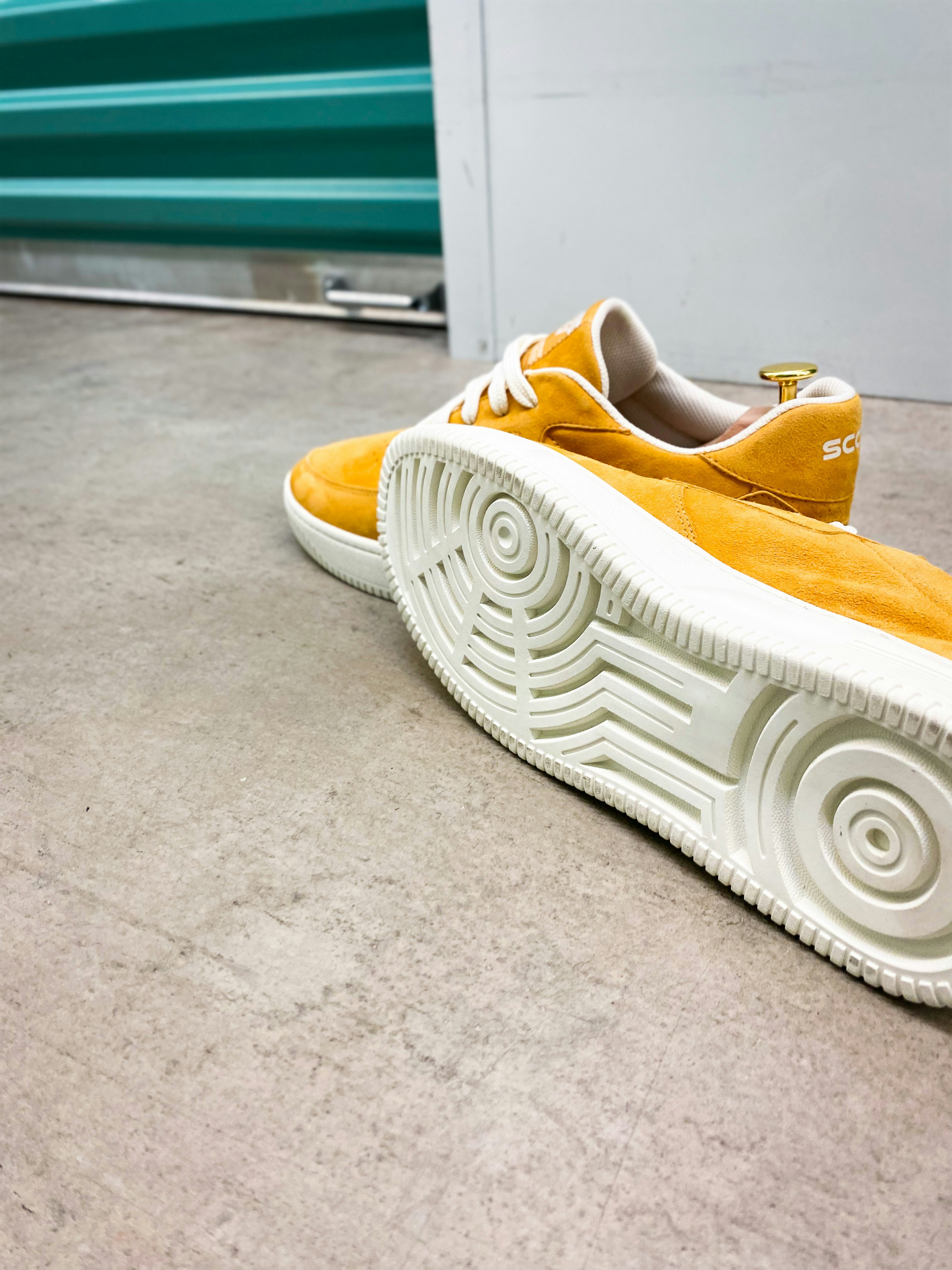 A pair of yellow and white shoes photo – Free Apparel Image on Unsplash