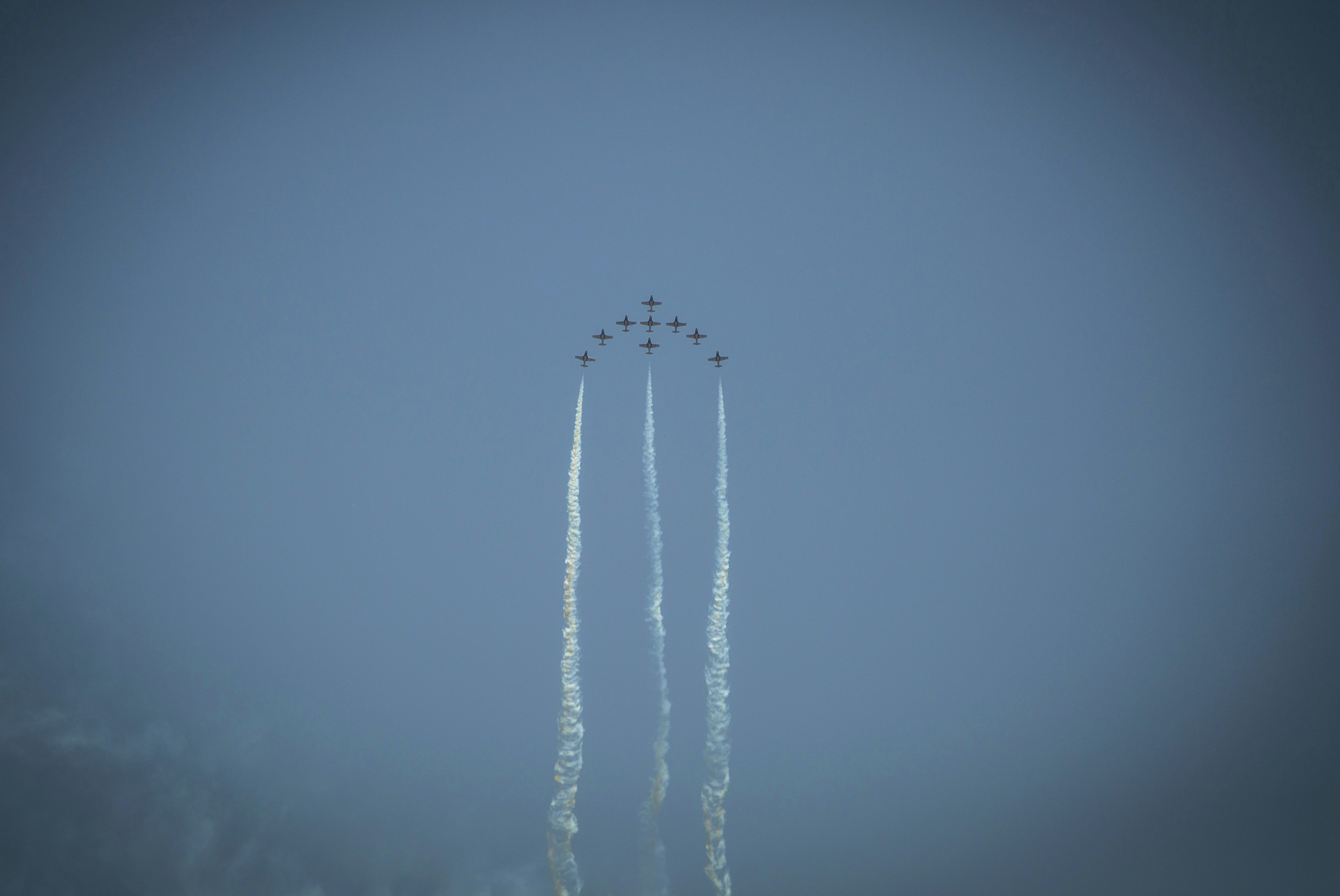 A group of planes flying in formation photo – Free Blue Image on Unsplash
