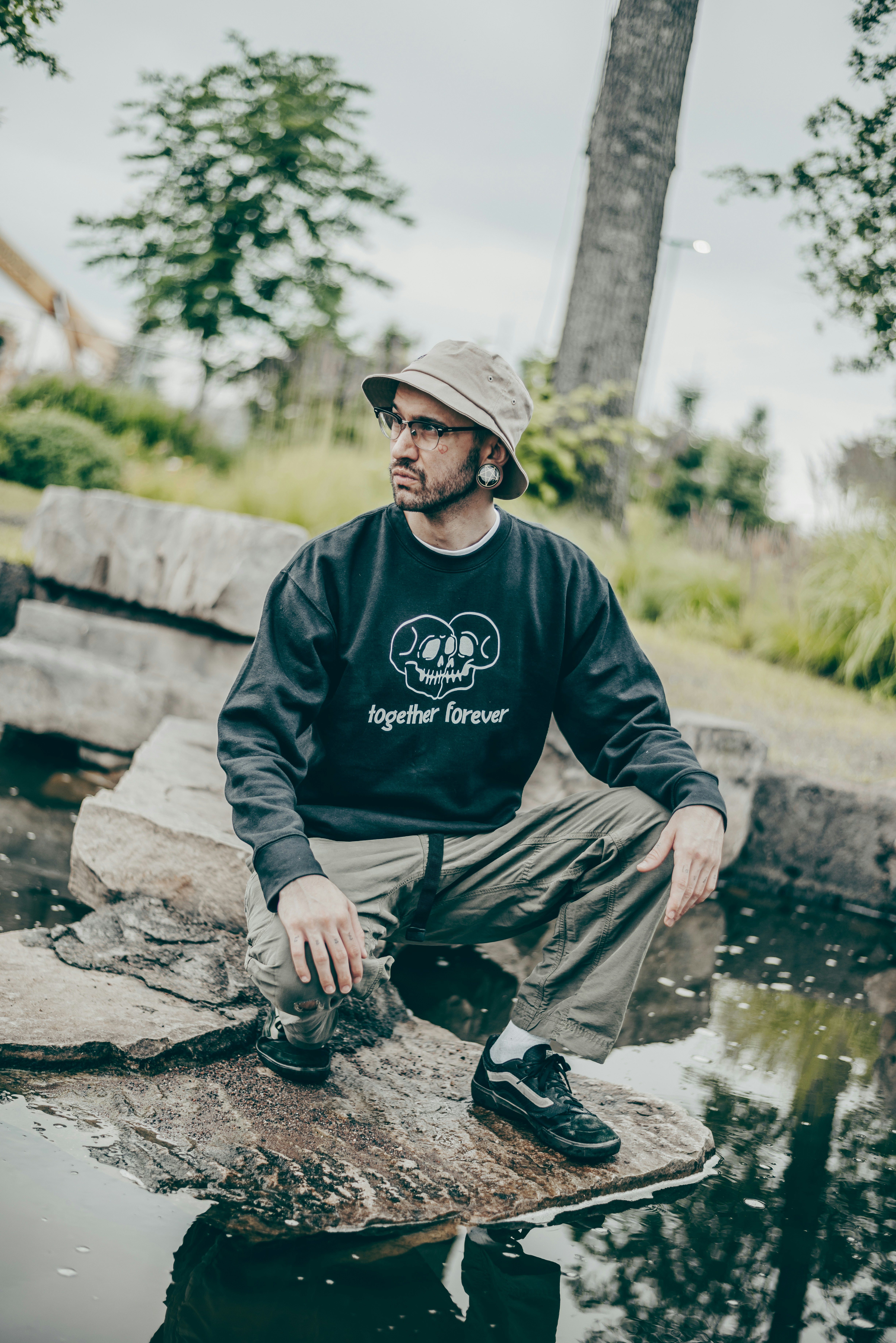 Reflective Pause by the Pond