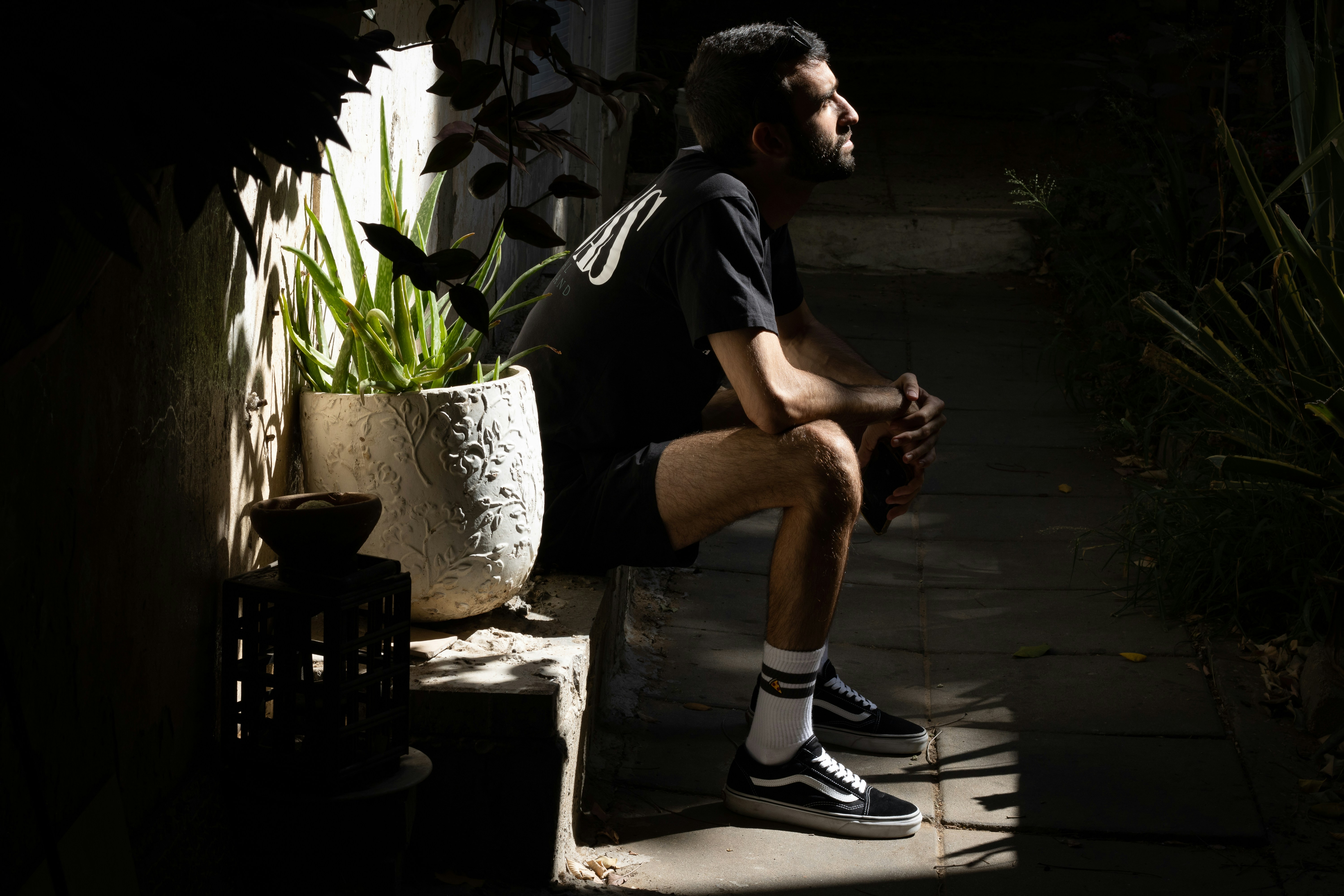 Moonlit Bench: A Quiet Portrait in Shadow and Light