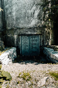 a stone monument with a sign on it