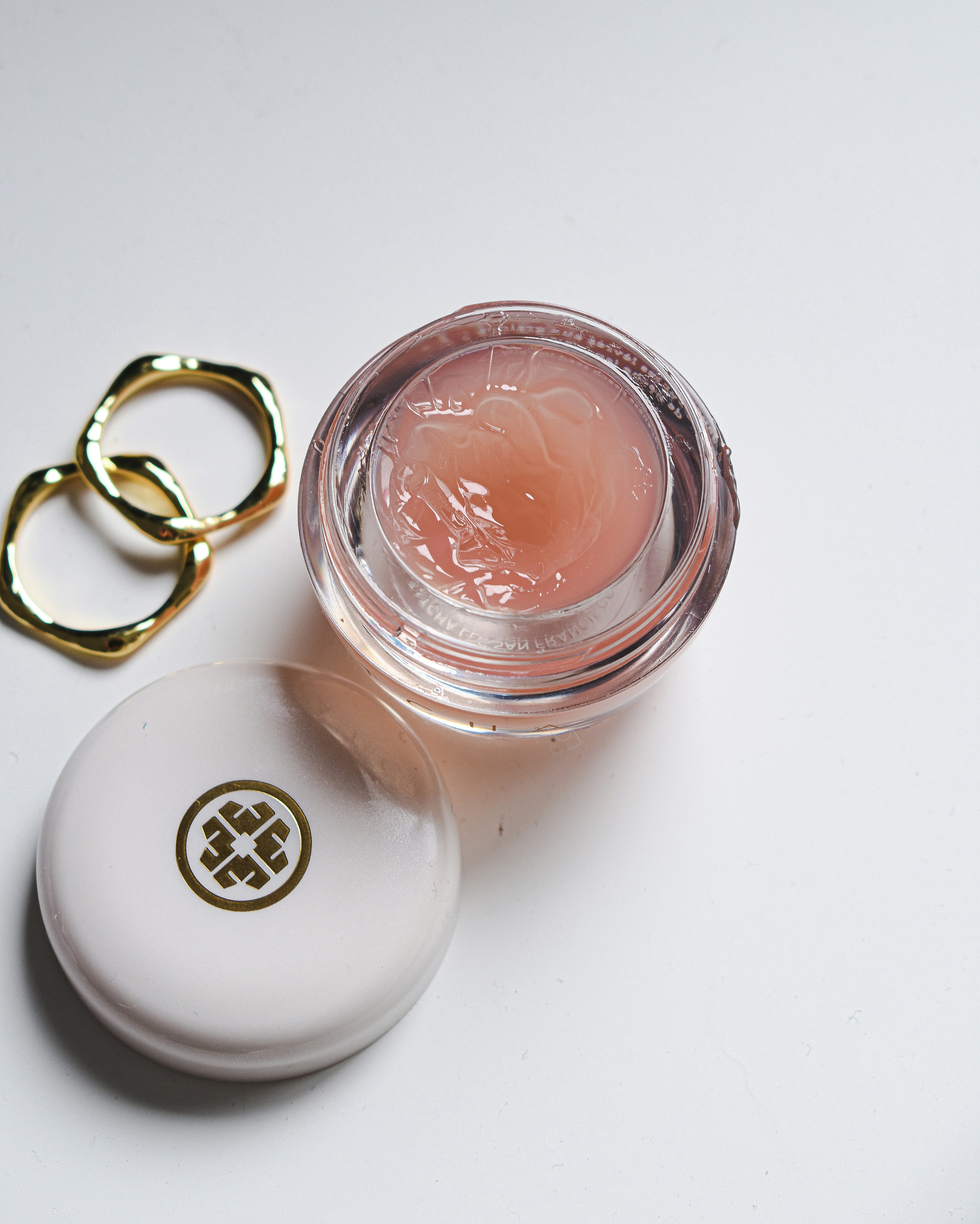 Petal-pink Lip Cream in a Glass Jar with Golden Ring Accents