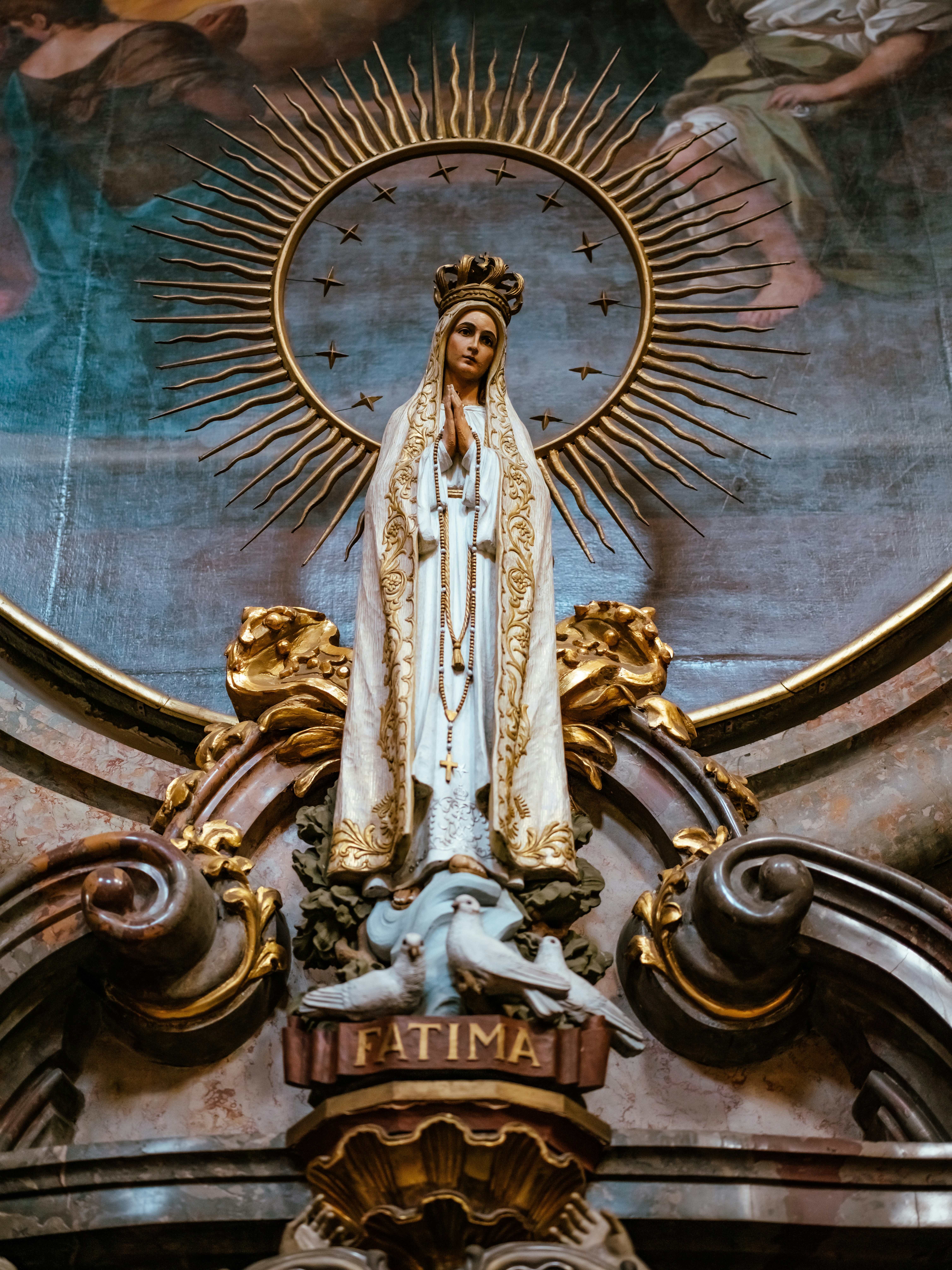 A golden religious statue photo – Free Building Image on Unsplash