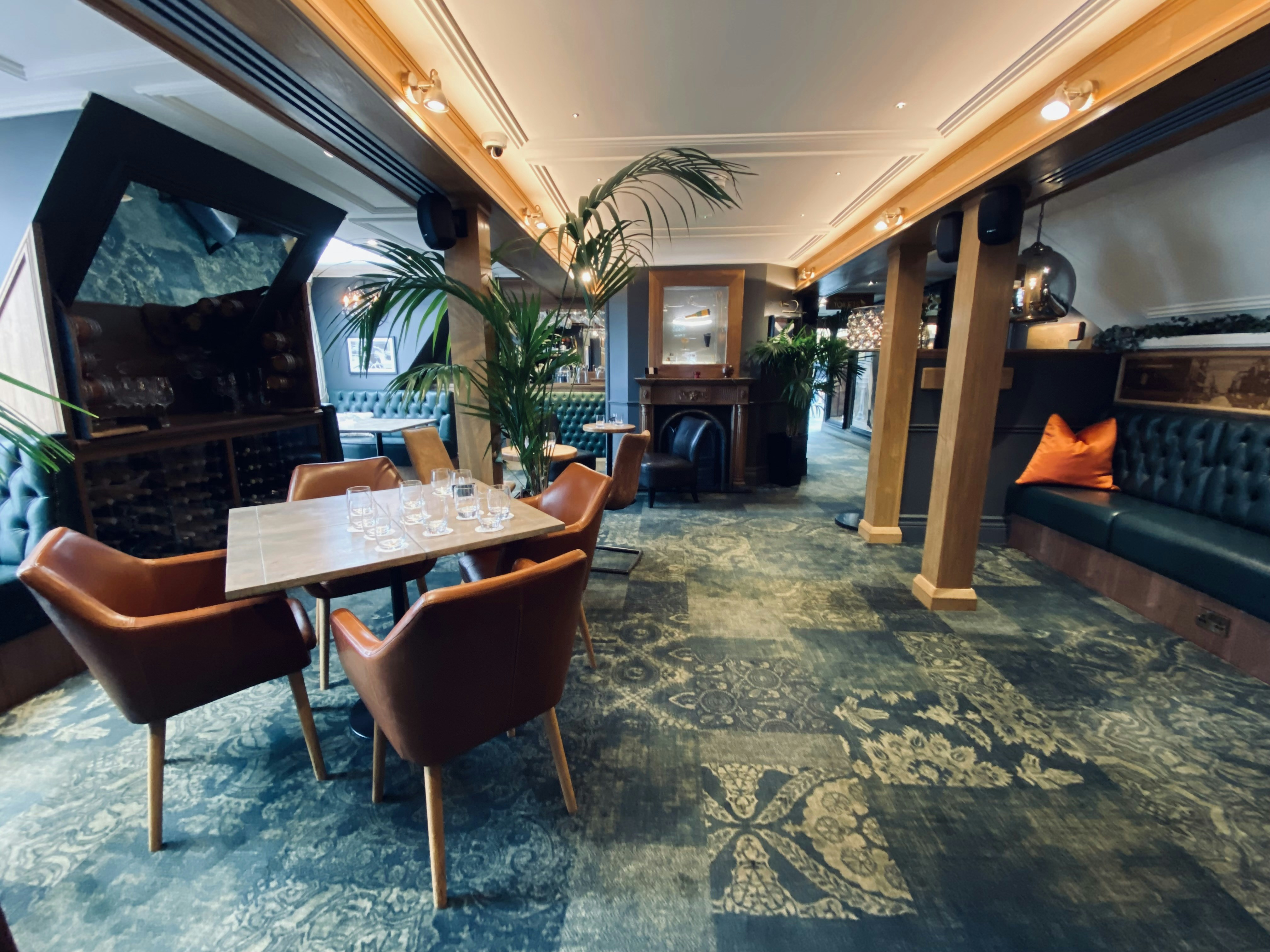 A dining room with a couch and chairs photo – Free Jacques Image on ...