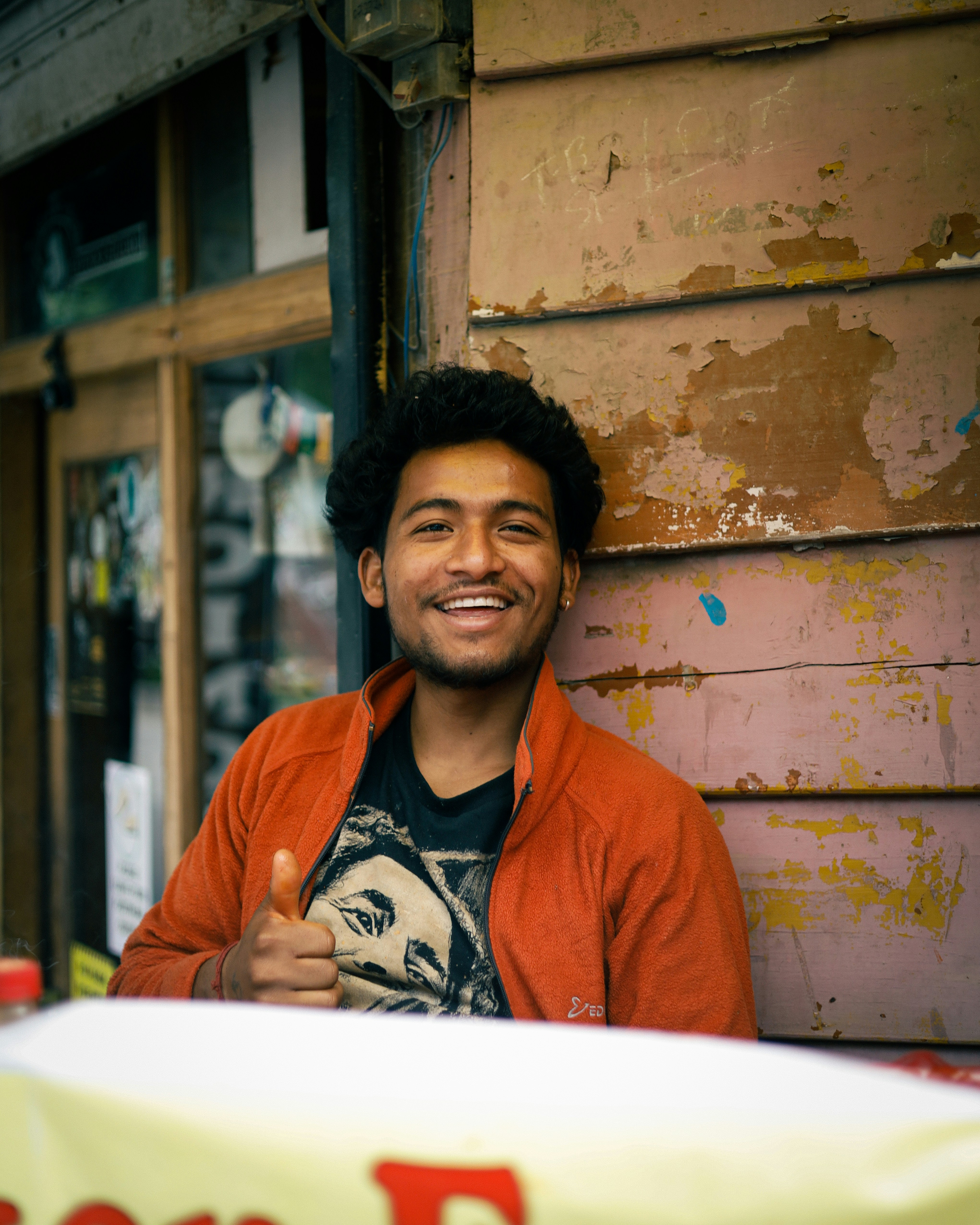 Smiling Portrait in a Weathered Alley