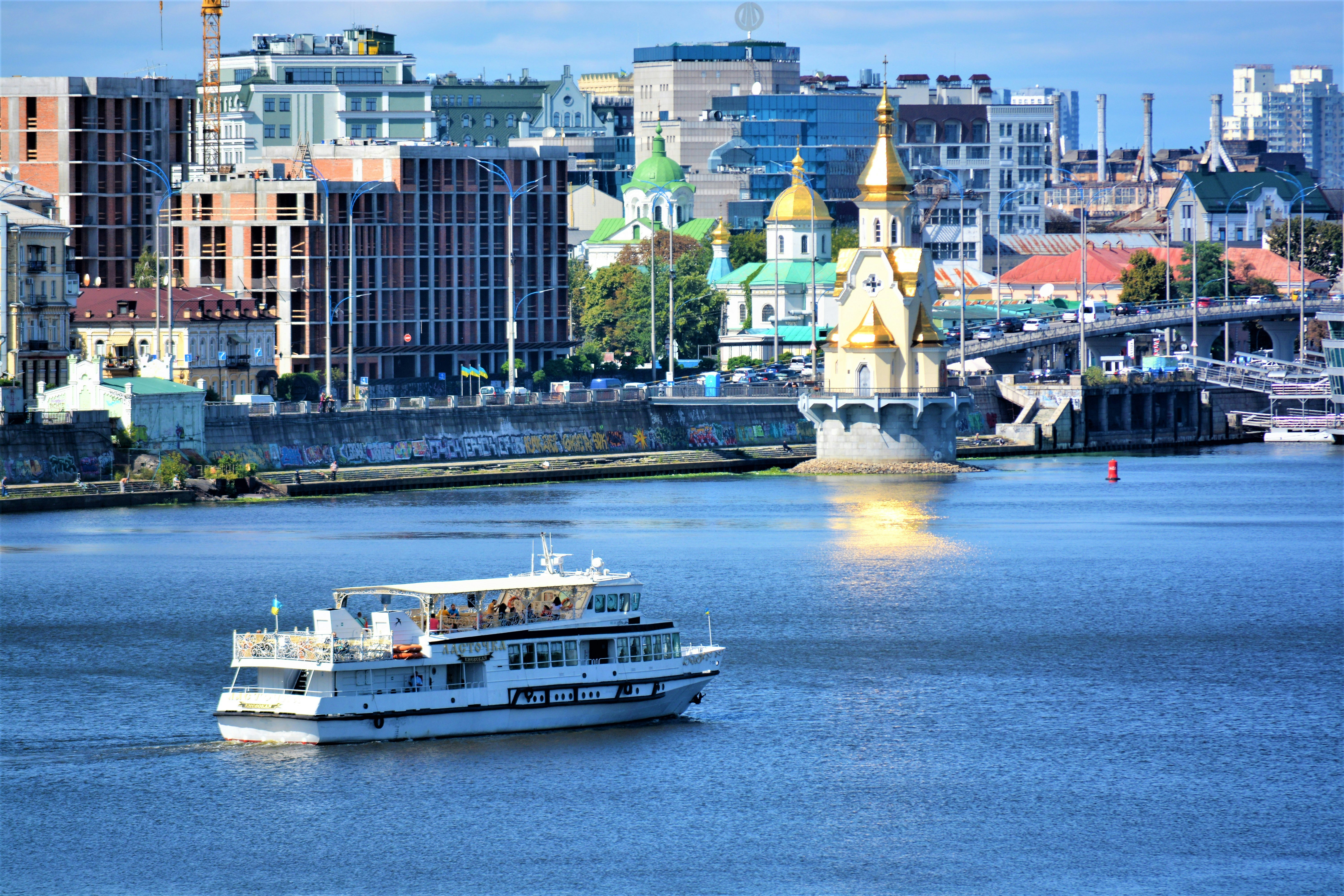 A boat in the water photo – Free Kiev Image on Unsplash