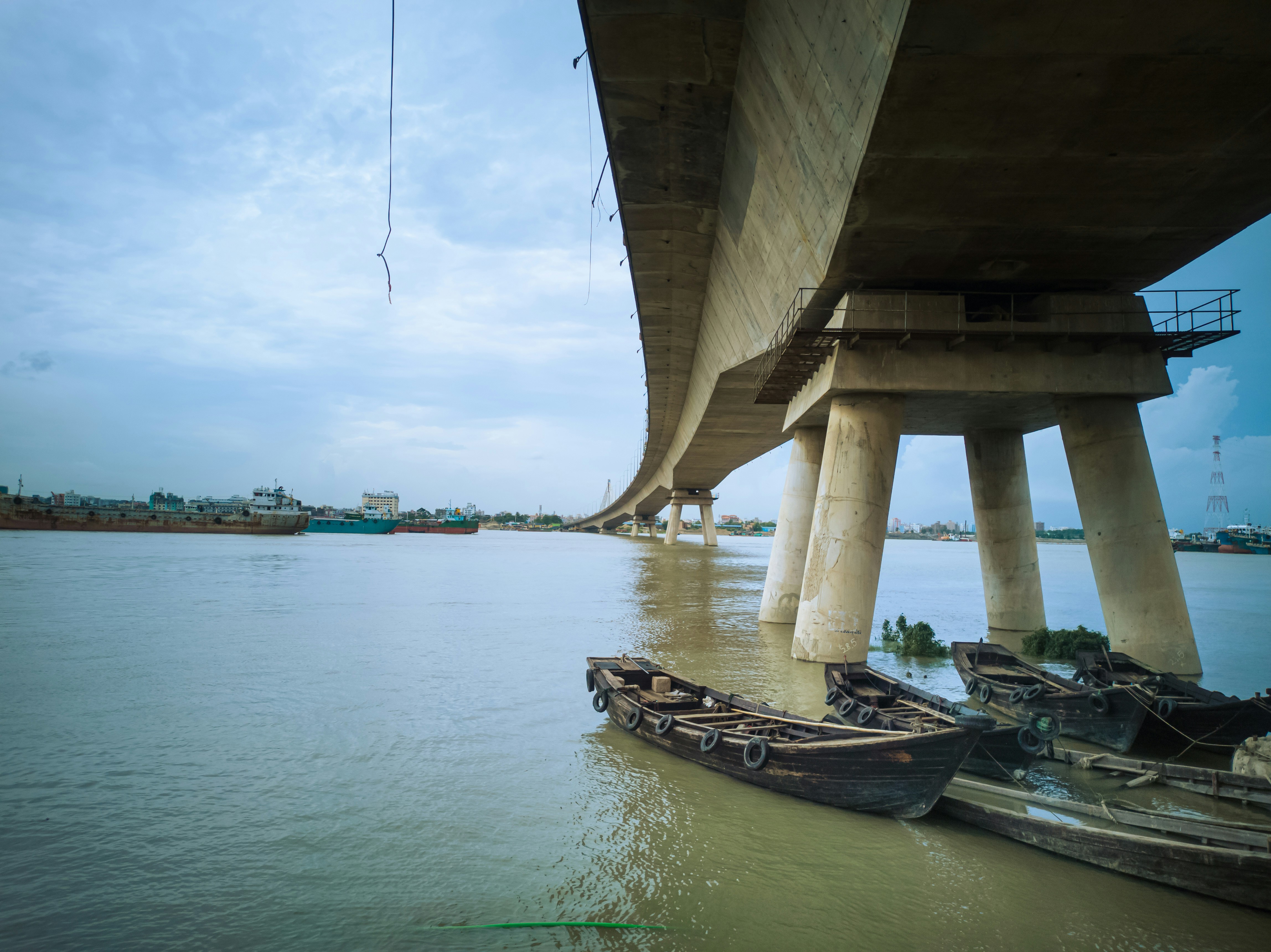 A bridge over water photo – Free Karnaphuli river Image on Unsplash