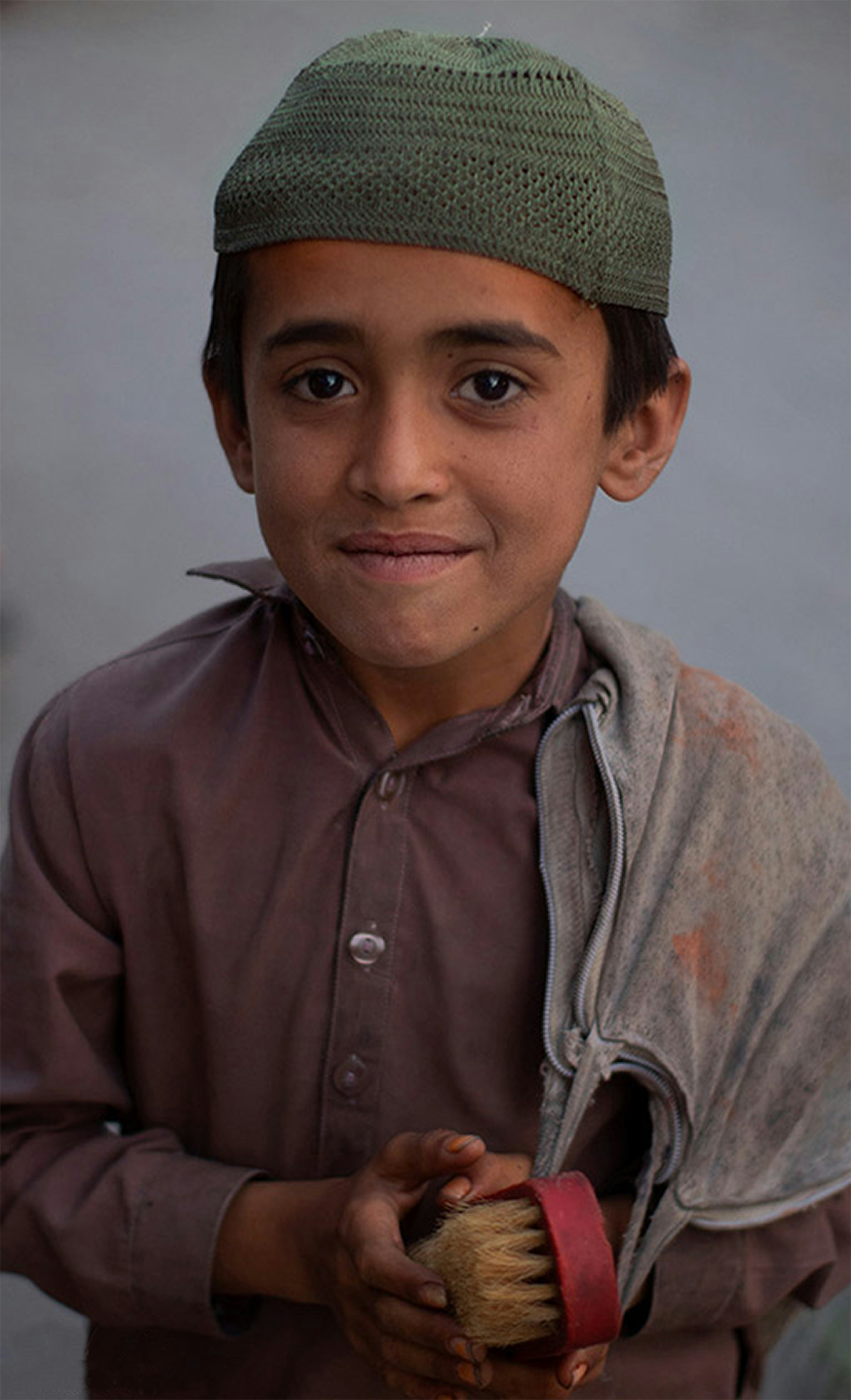 A boy wearing a hat photo – Free Quetta city Image on Unsplash